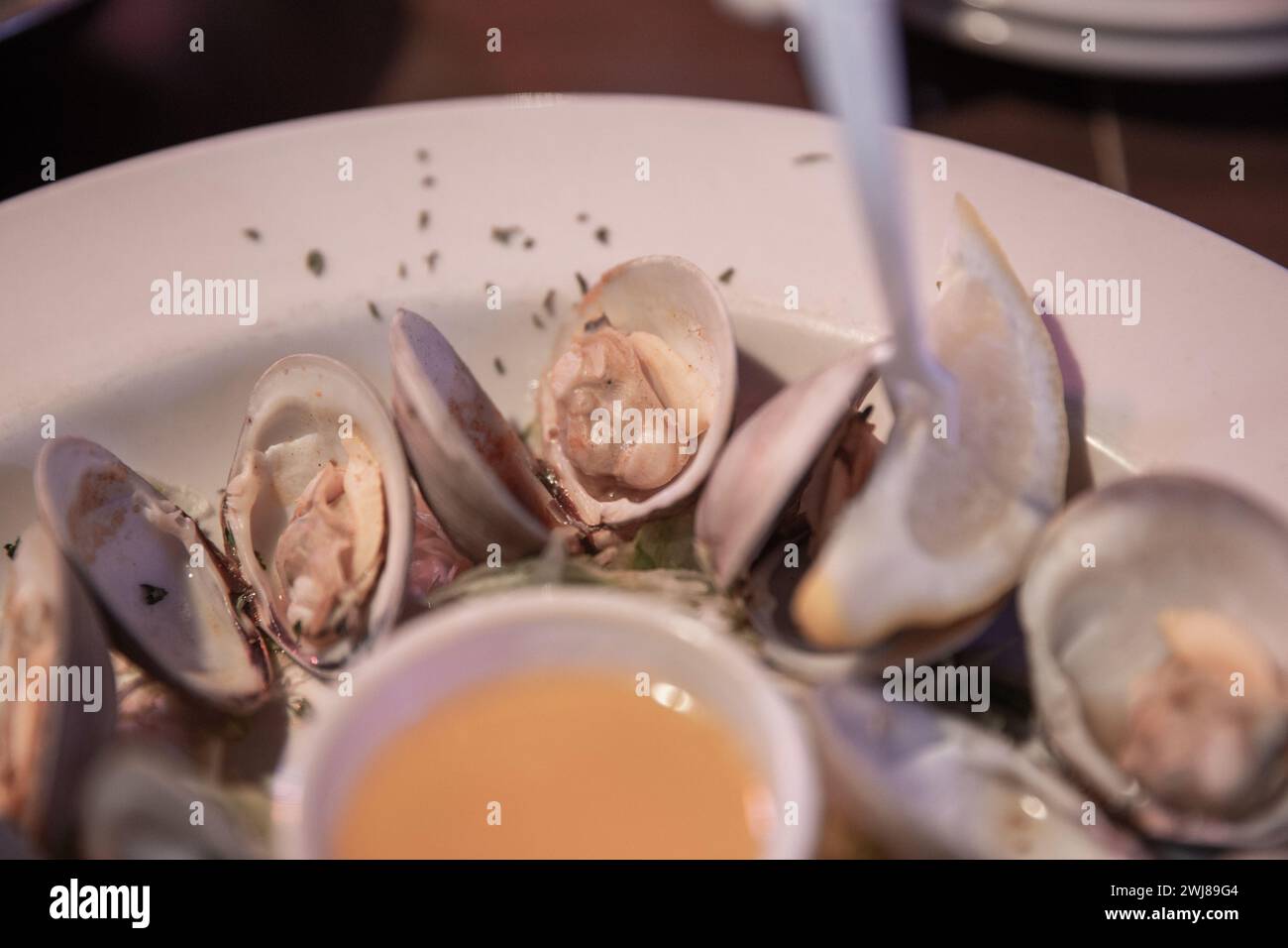 Steamed Clams with Butter at a sports bar Stock Photo - Alamy