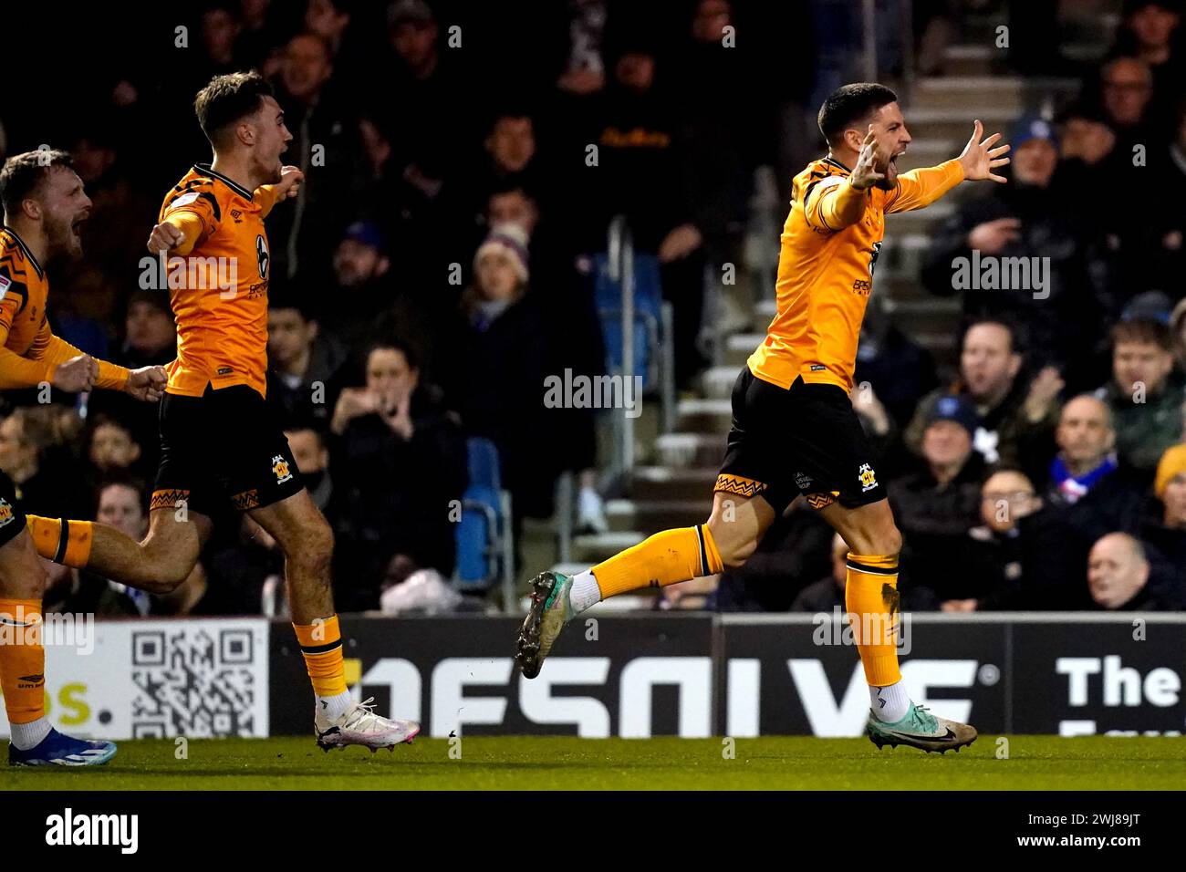 Cambridge United's Danny Andrew (right) celebrates scoring their side's ...
