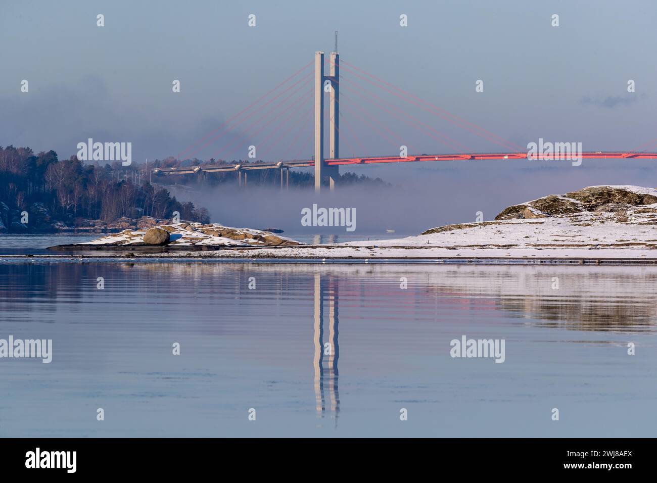 Fog under bridge between town Stenungsund and island Tjörn on Swedens ...