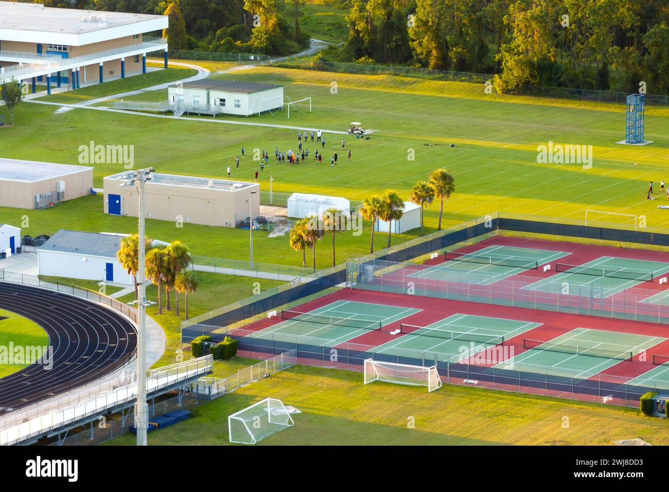 Public school open air tennis court with new stadiums in rural Florida ...