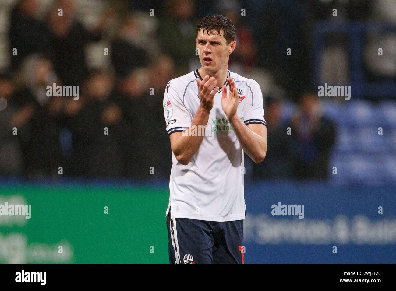 Eoin Toal #18 of Bolton Wanderers applauds the fans during the Sky Bet ...