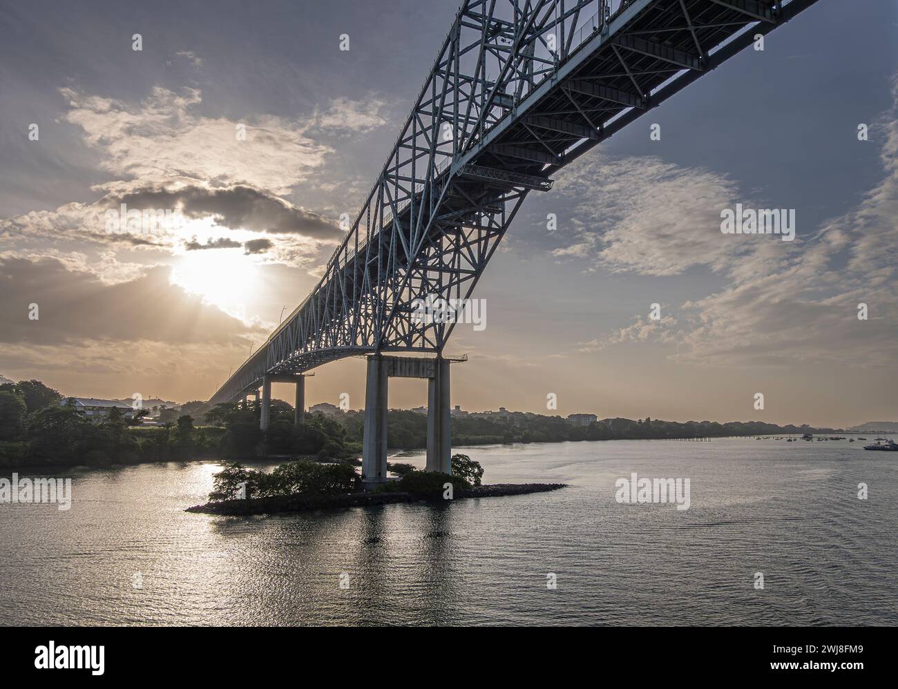 Panama Canal, Panama - July 24, 2023: Sun rises over suspension bridge ...