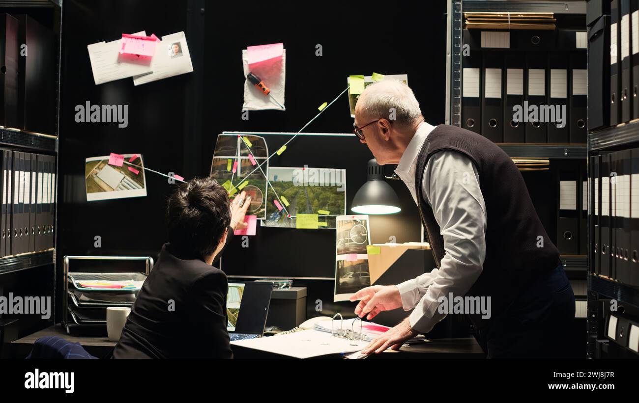 Partners gather criminal intelligence on clues board, teamwork to solve ...