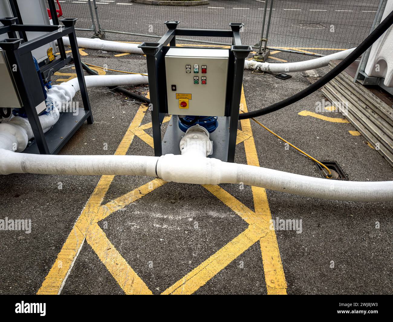 Metal pipes covered with a layer of frost. Industrial refrigerating ...