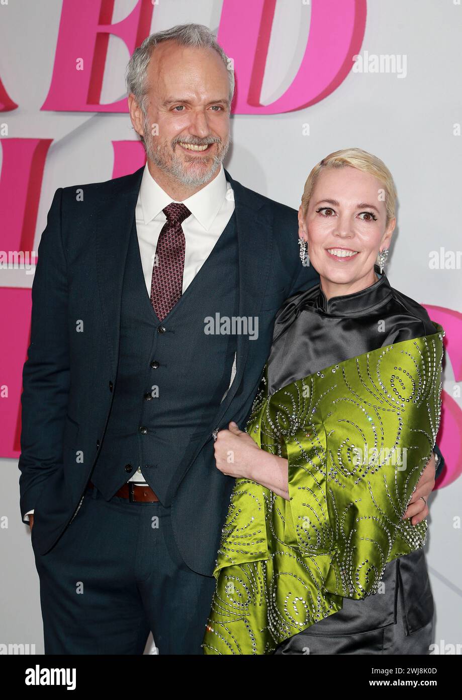 London, UK. 13th Feb, 2024. Ed Sinclair and Olivia Colman attend the ...