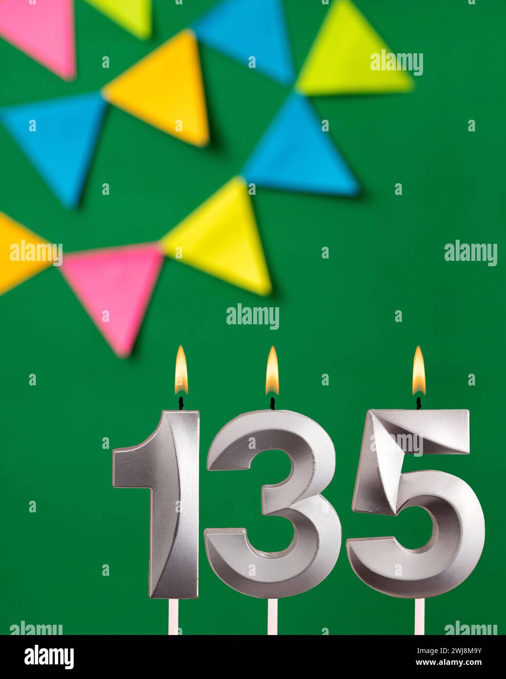 Vertical birthday card with number 135 candle - Green background with ...
