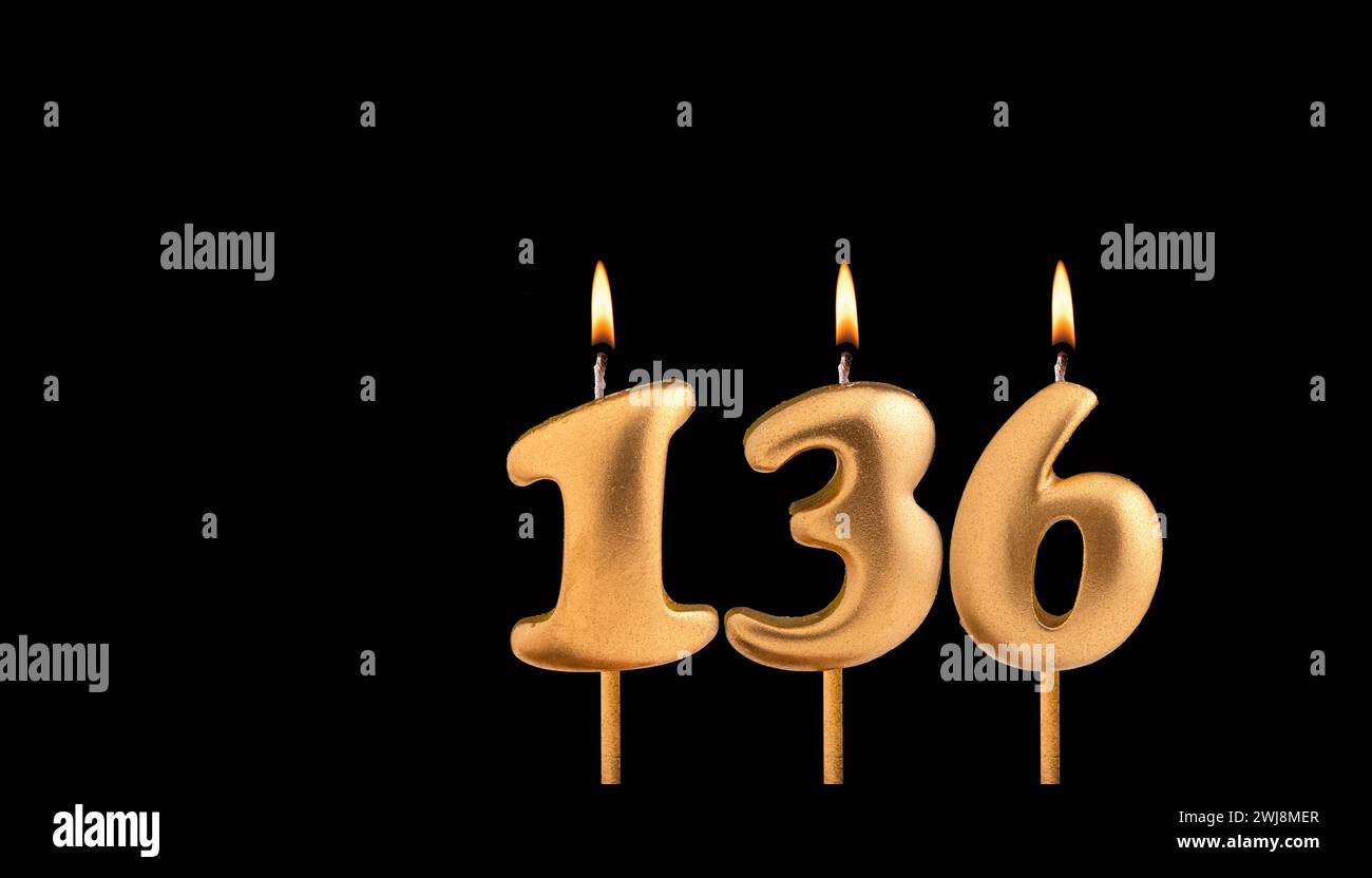 Birthday candle number 136 - Birthday celebration on black background ...