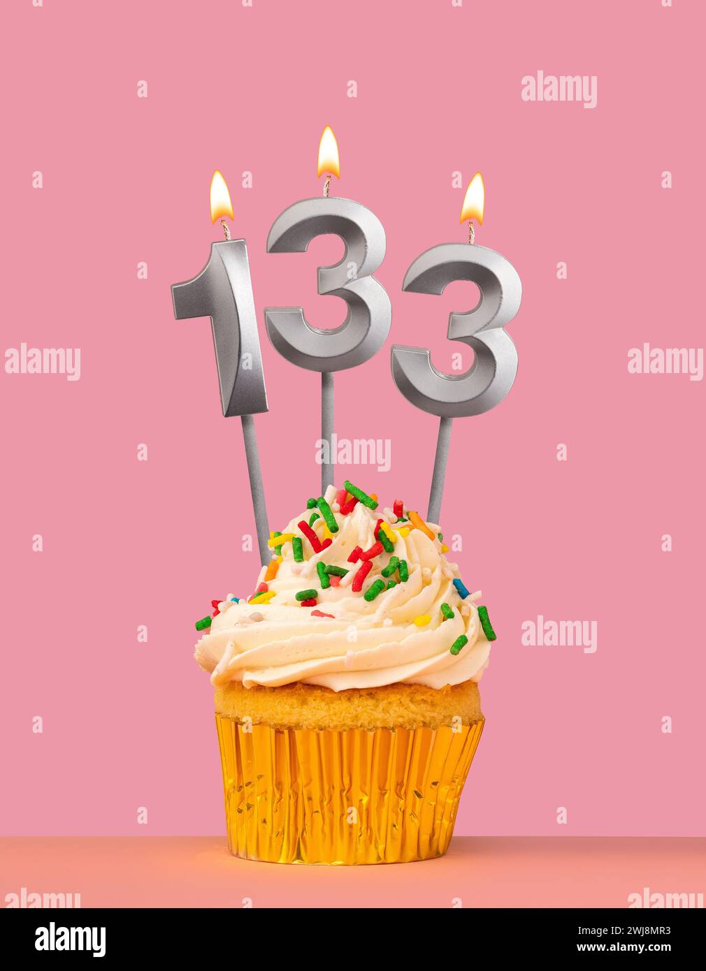 Birthday card with cupcake and candle number 133 Stock Photo - Alamy