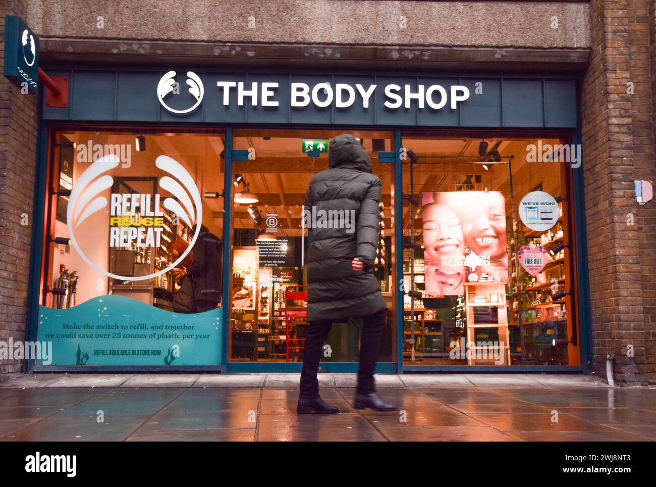 London, UK. 13th February 2024. A person walks past a Body Shop store ...