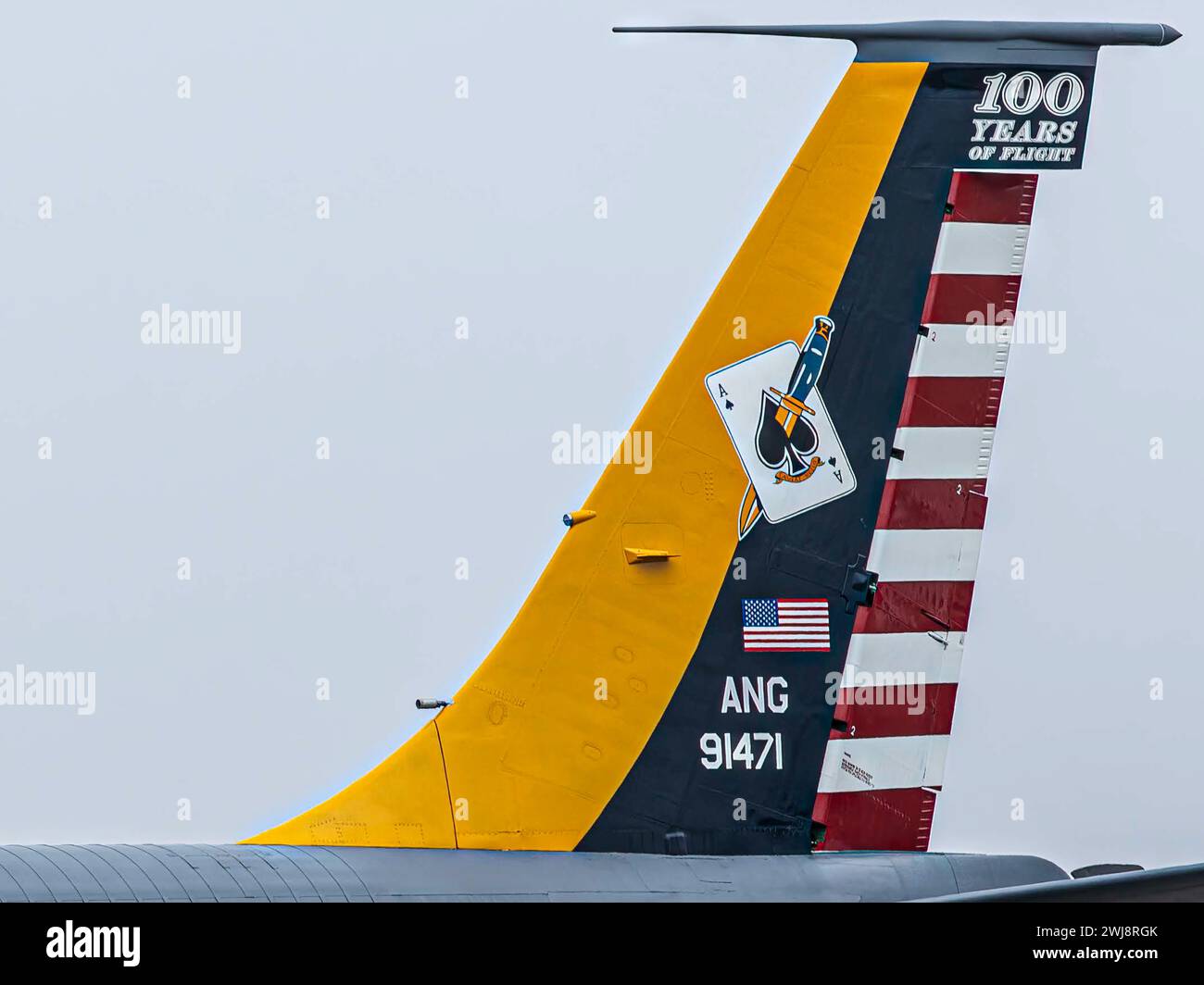 The newly painted tail of a KC-135 is captured on the flight line at ...