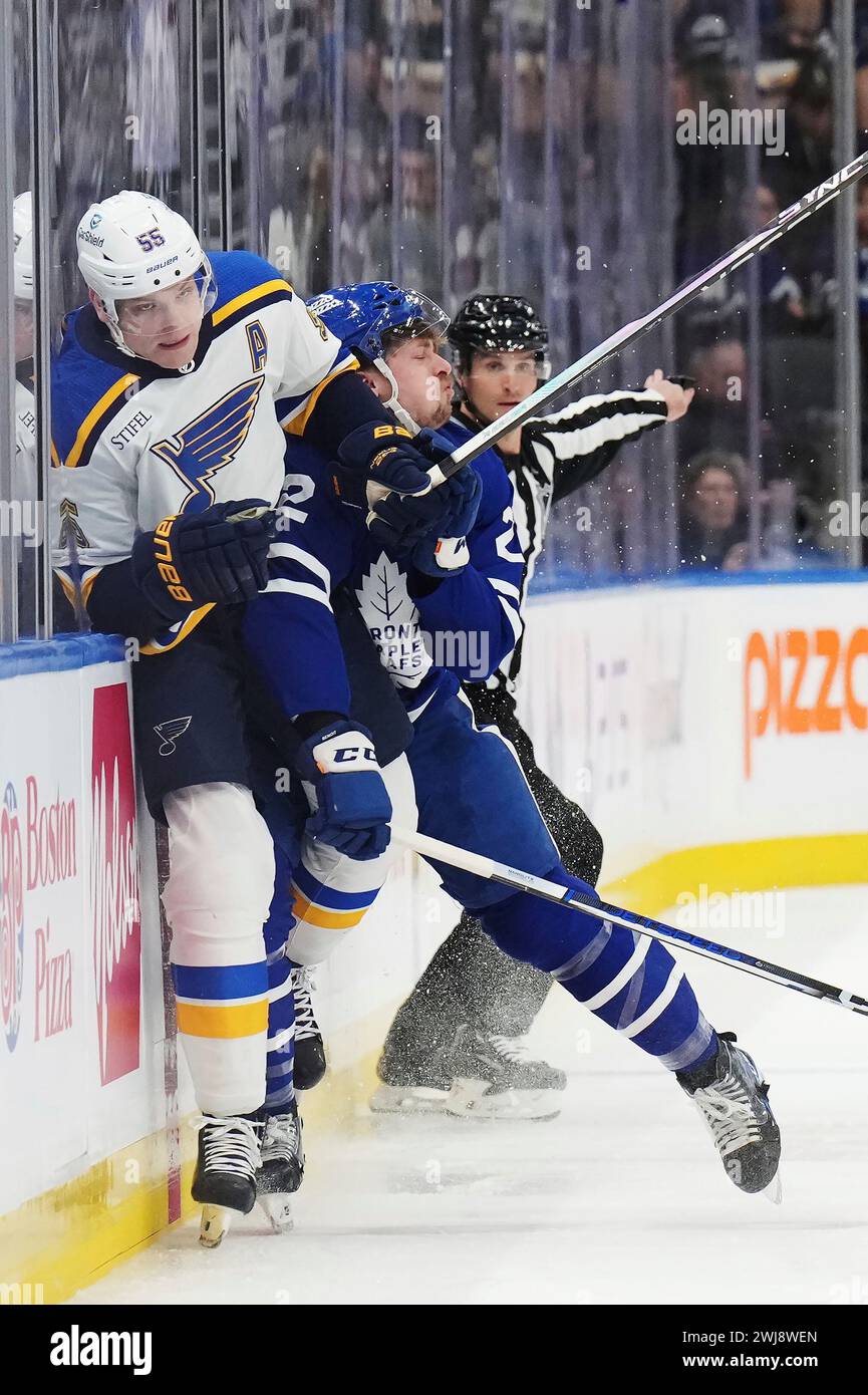 St. Louis Blues defenseman Colton Parayko (55) is checked by Toronto ...