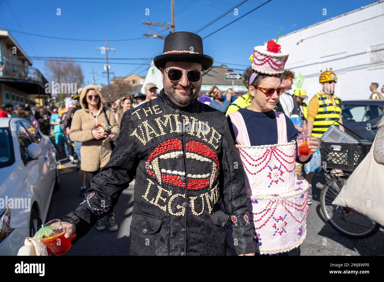Paradegoers are seen during the Krewe of Red Beans Mardi Gras Parade in ...