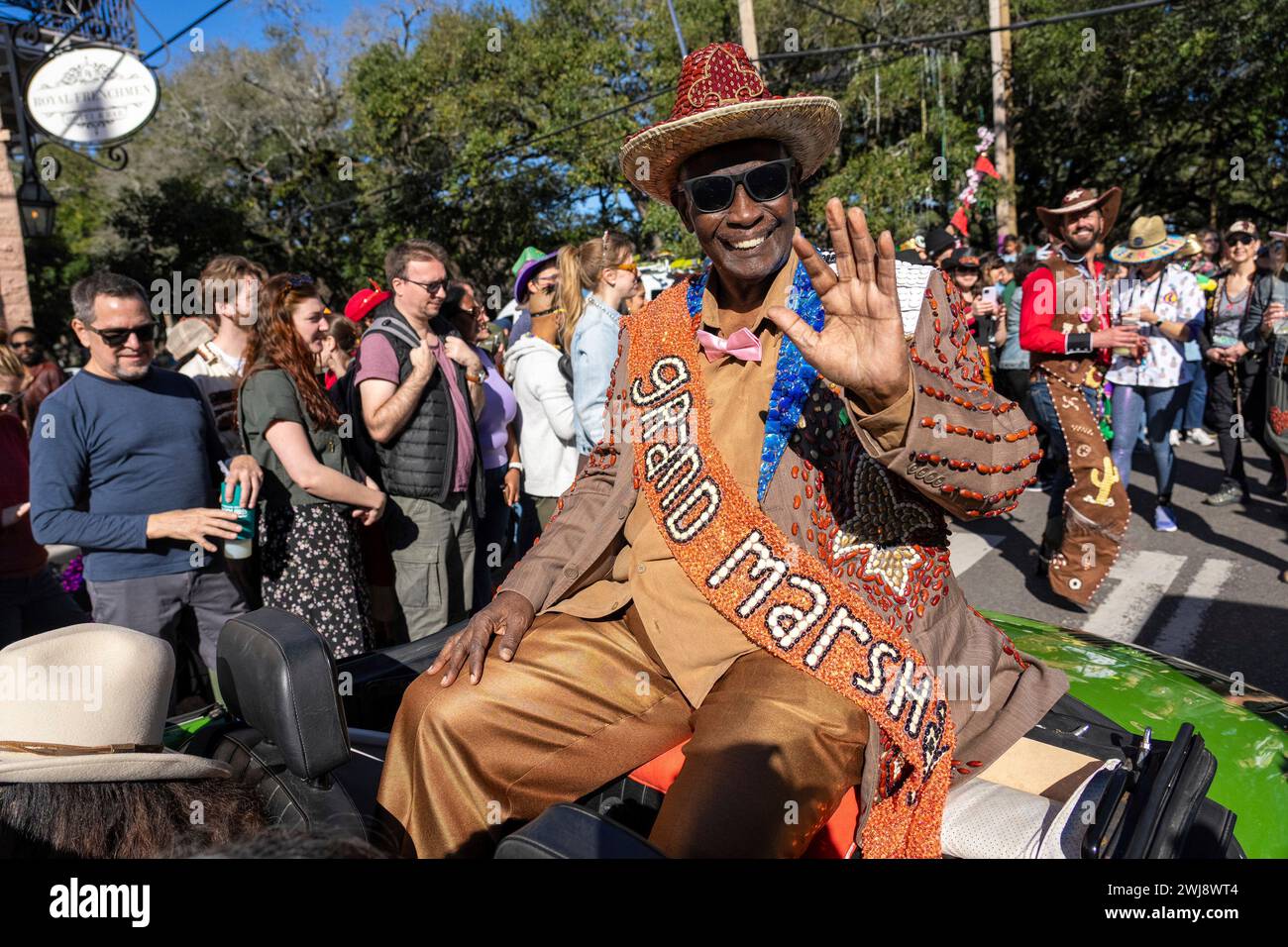 Paradegoers are seen during the Krewe of Red Beans Mardi Gras Parade in ...