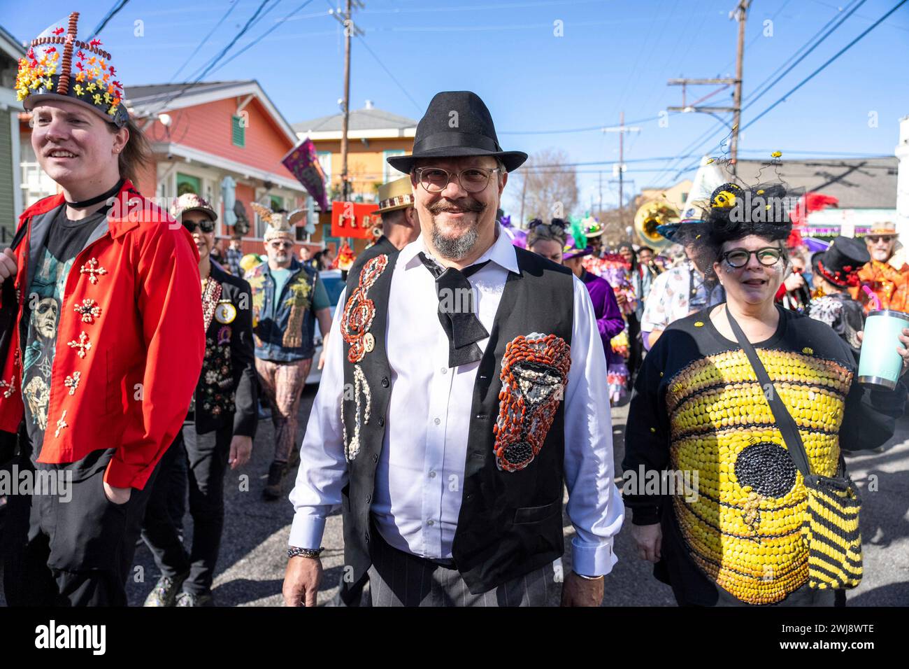 Paradegoers are seen during the Krewe of Red Beans Mardi Gras Parade in ...