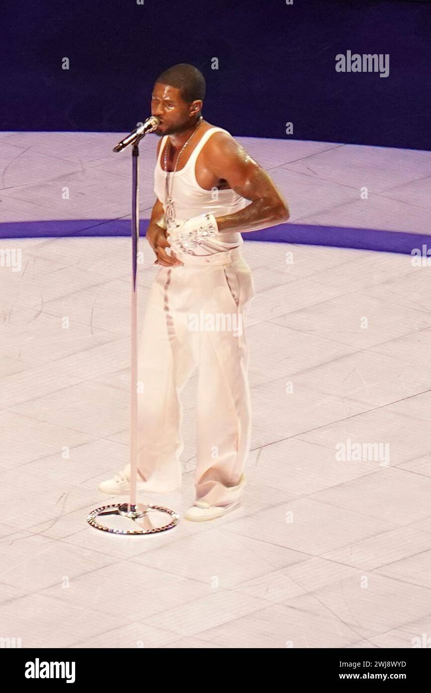 Usher performs during half-time of Super Bowl 58 NFL football game ...