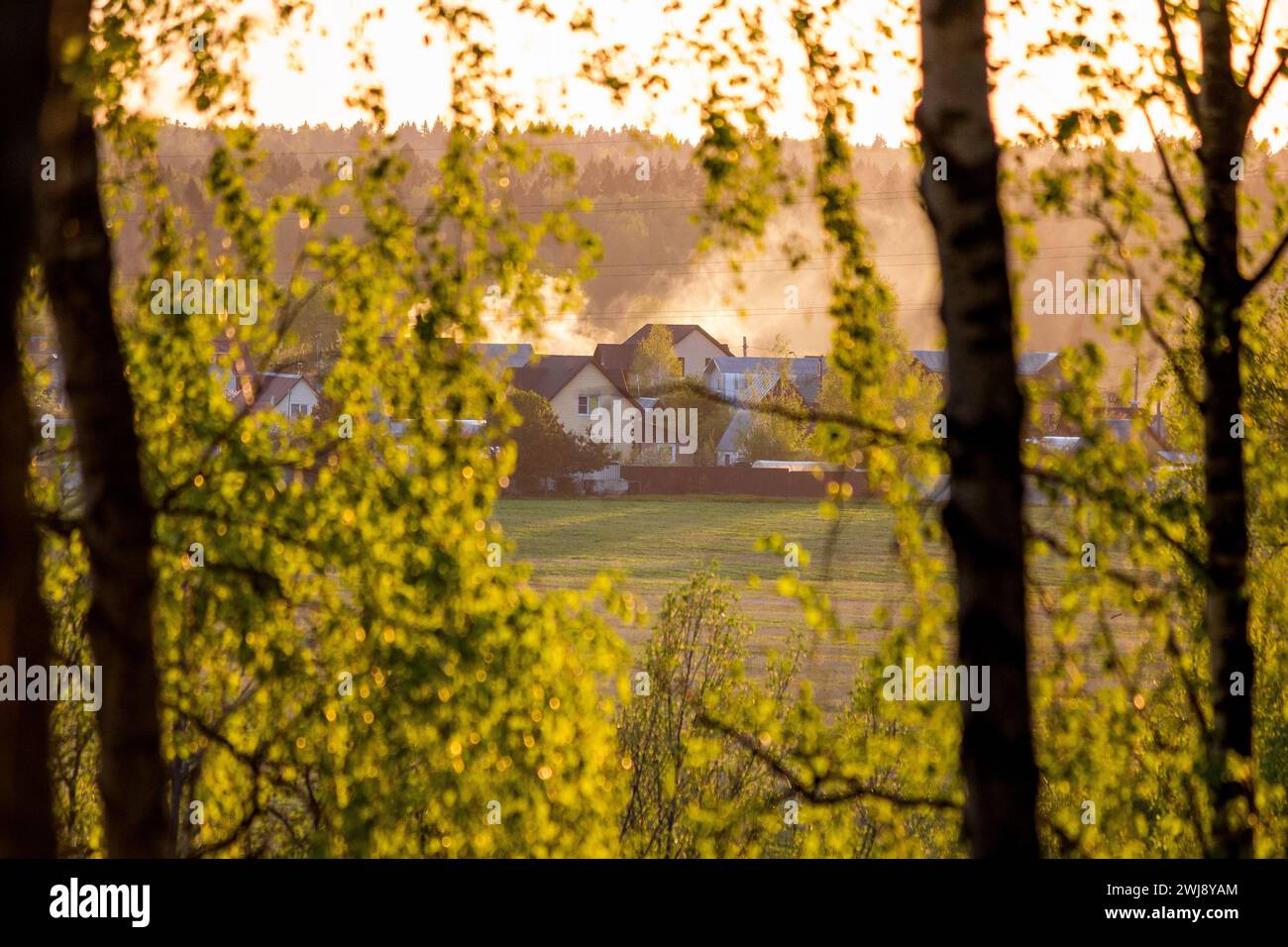 Country houses in nature. View of the summer cottage village from the ...