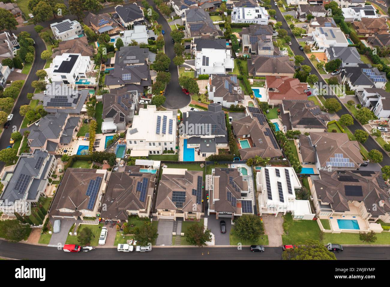 Zoomed out aerial view of an upmarket neighbourhood with modern ...
