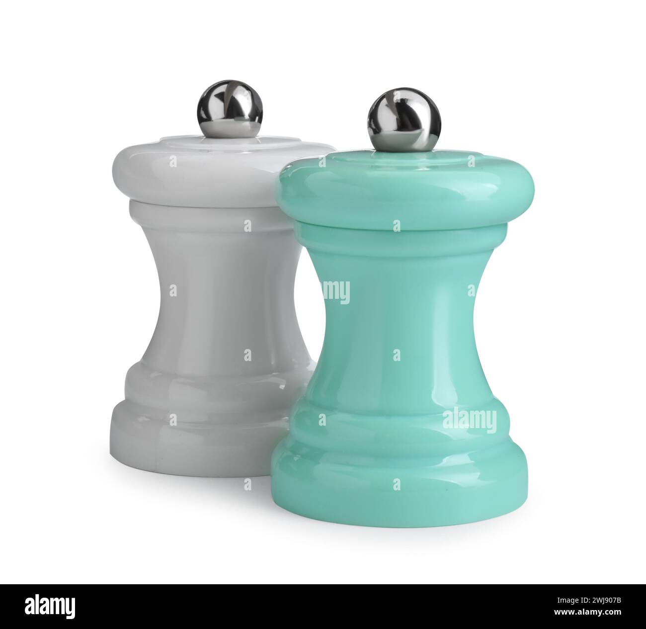 Salt and pepper shakers isolated on white Stock Photo - Alamy