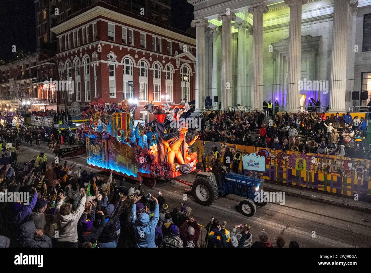 Paradegoers are seen during the Krewe of Proteus Mardi Gras Parade in ...
