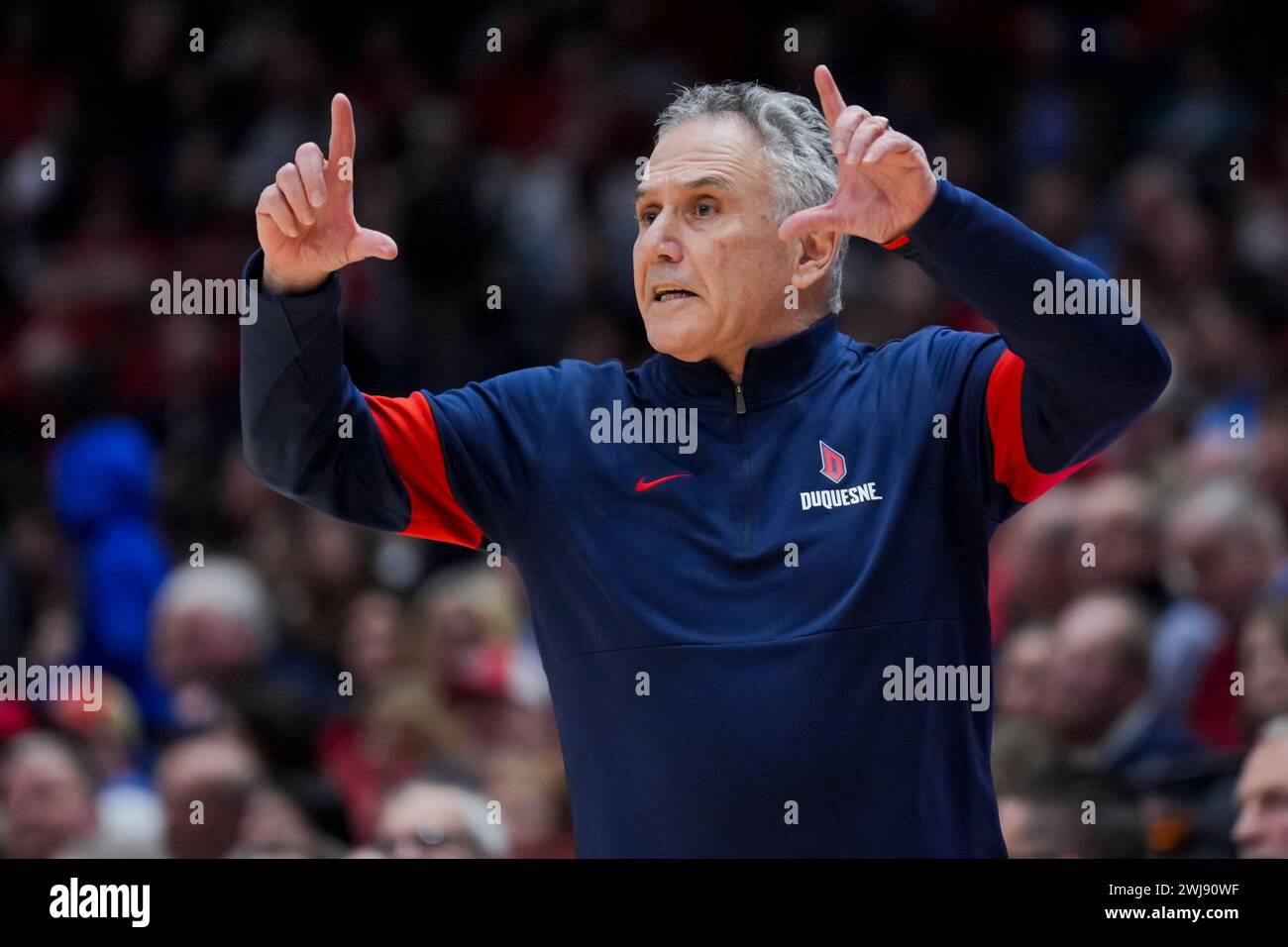 Duquesne head coach Keith Dambrot works the sideline during the first ...
