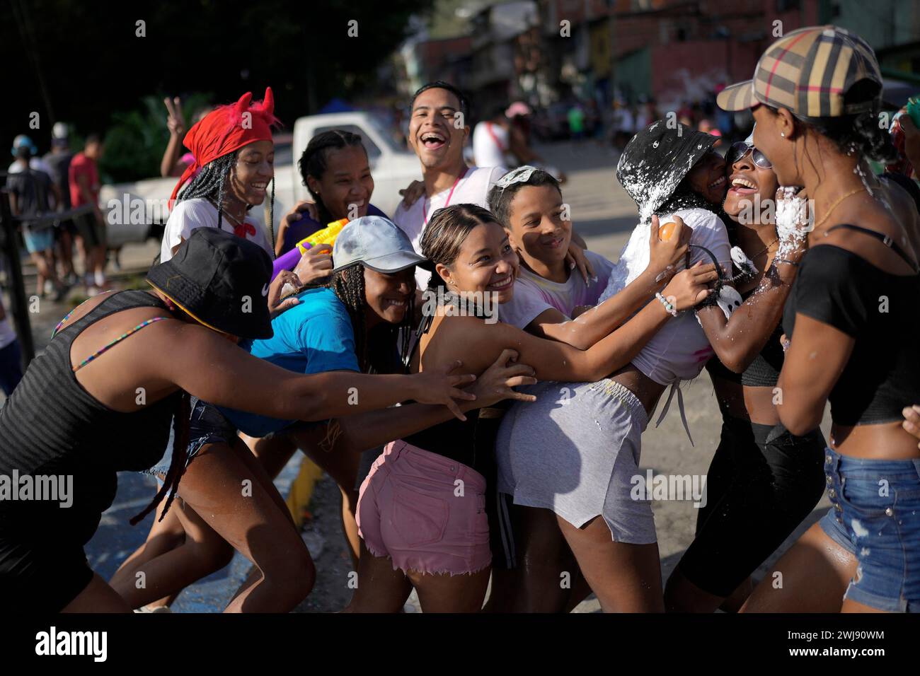 Women gather during carnival celebrations in the Pinto Salinas ...