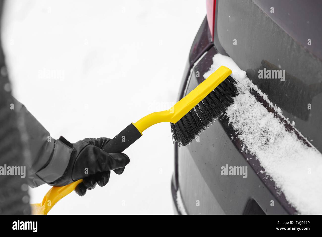 Man cleaning snow hi-res stock photography and images - Alamy