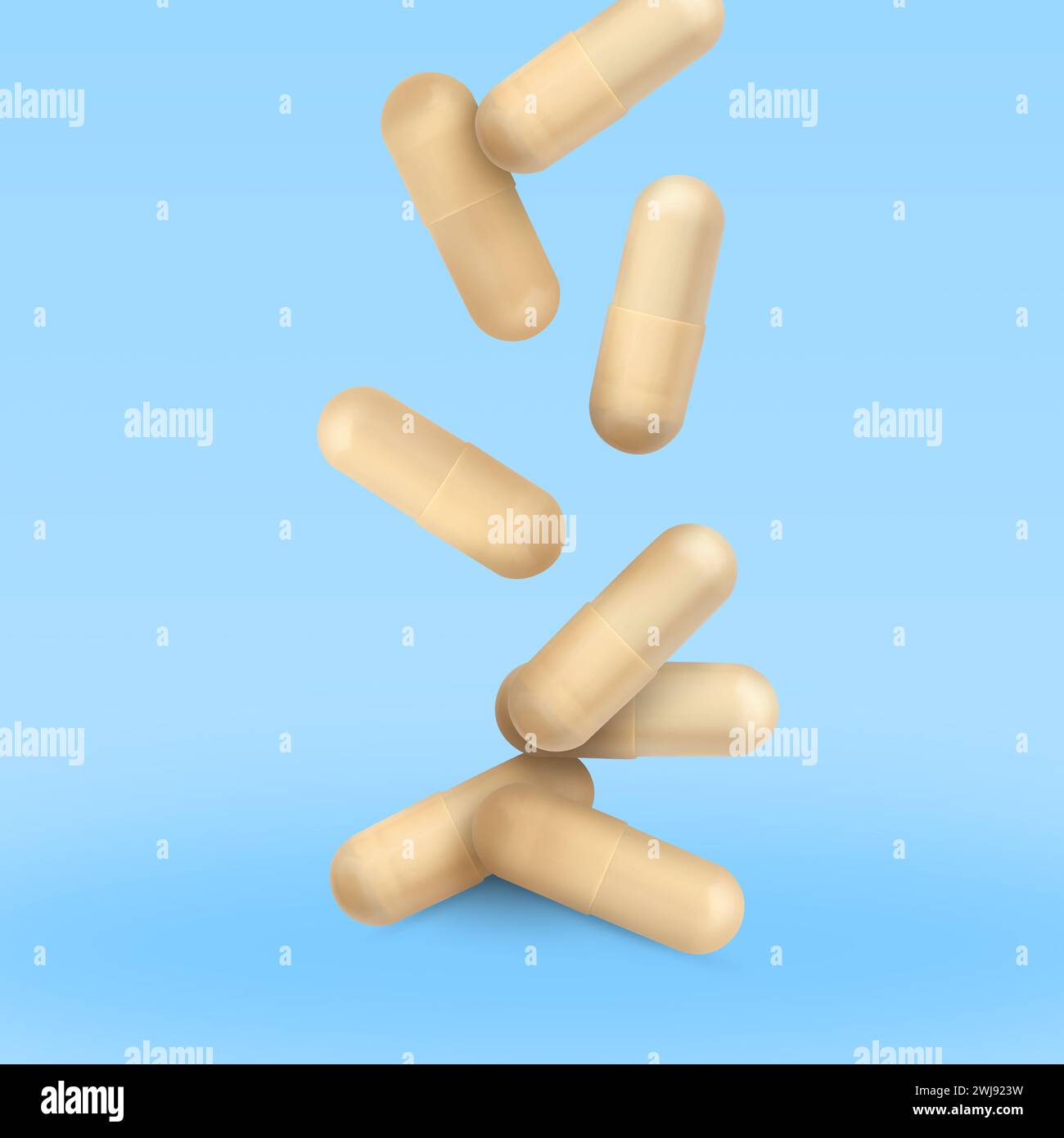 Vitamin. Capsules falling on light blue gradient background Stock Photo ...