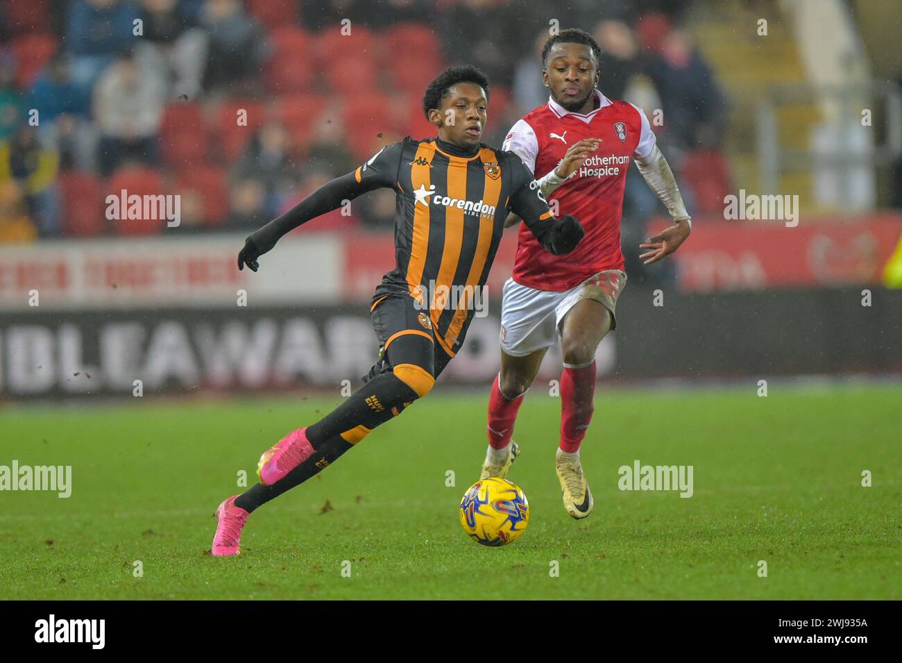 Jaden Philogene-Bidace of Hull City breaks past Cafú of Rotherham ...