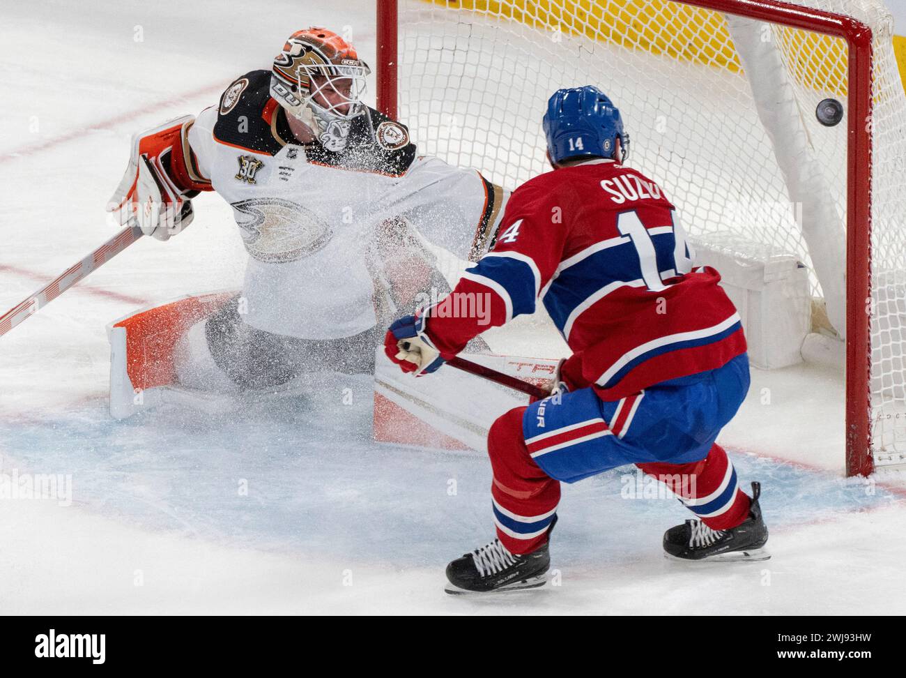 Montreal Canadiens' Nick Suzuki (14) scores on Anaheim Ducks goaltender ...