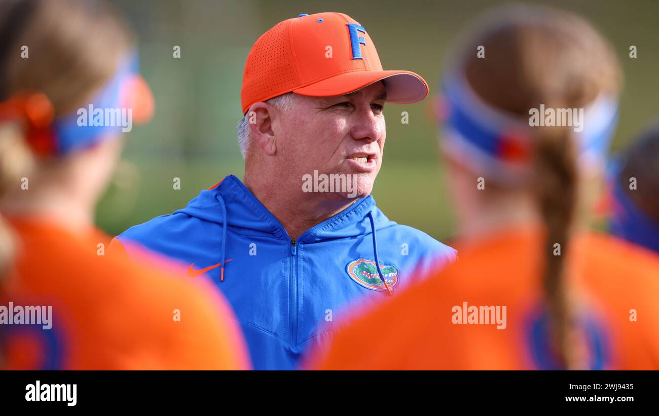 Florida head coach Tim Walton talks to his team before an NCAA softball ...