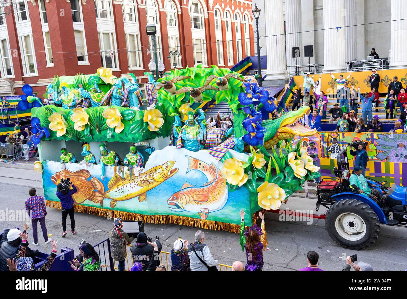 Paradegoers are seen during the Krewe of Rex Mardi Gras Parade in ...