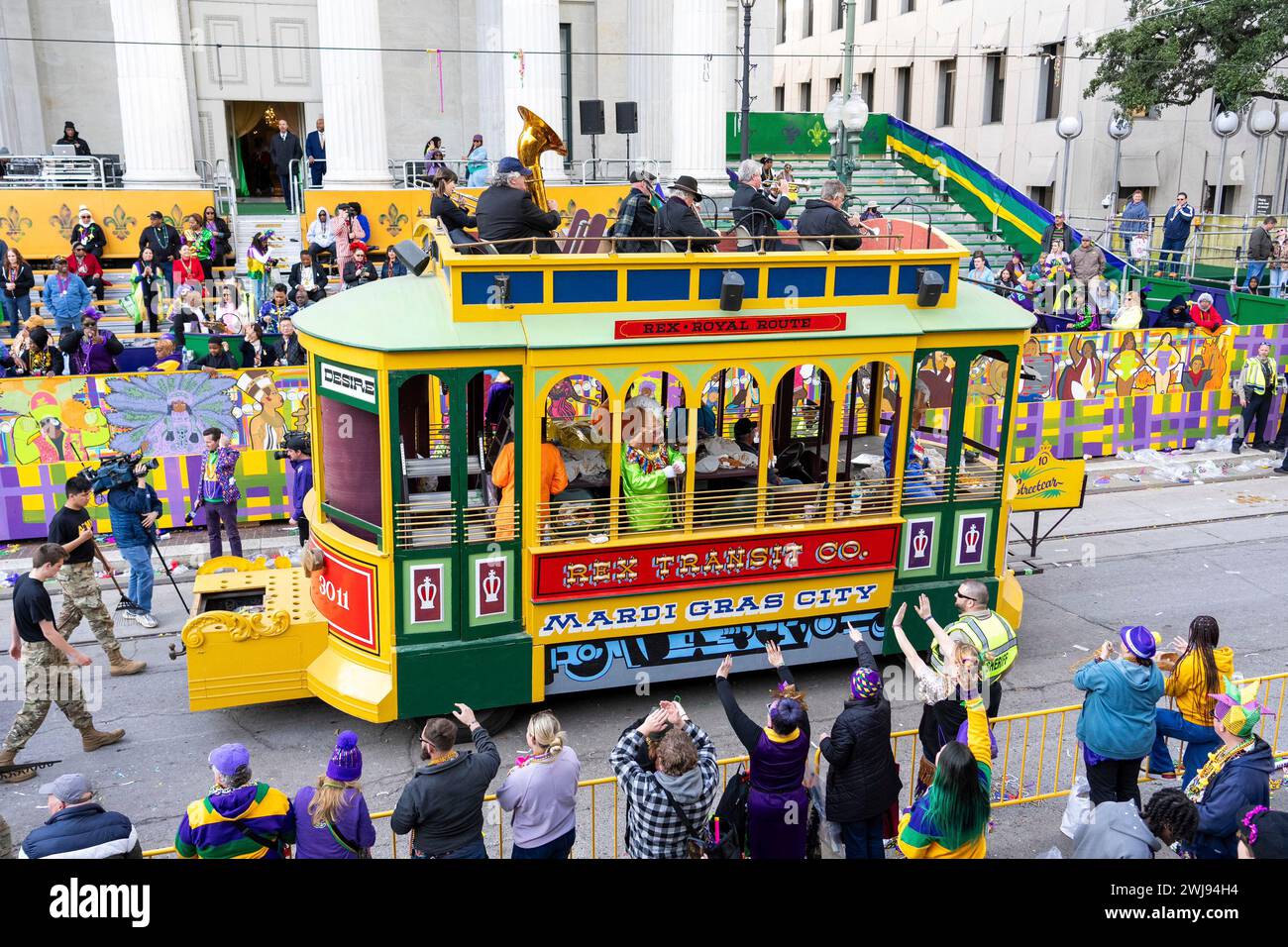 Paradegoers are seen during the Krewe of Rex Mardi Gras Parade in ...