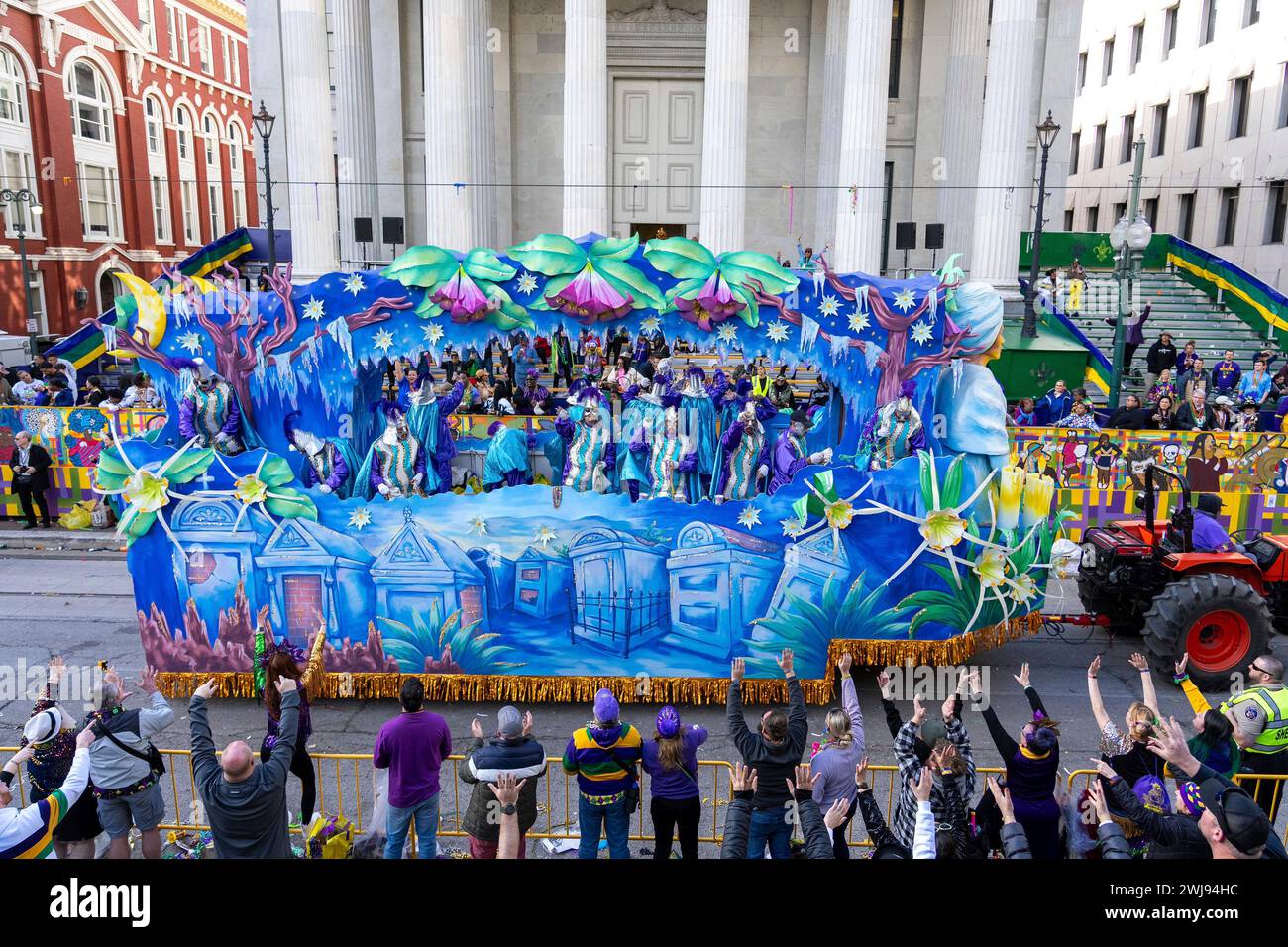 Paradegoers are seen during the Krewe of Rex Mardi Gras Parade in ...