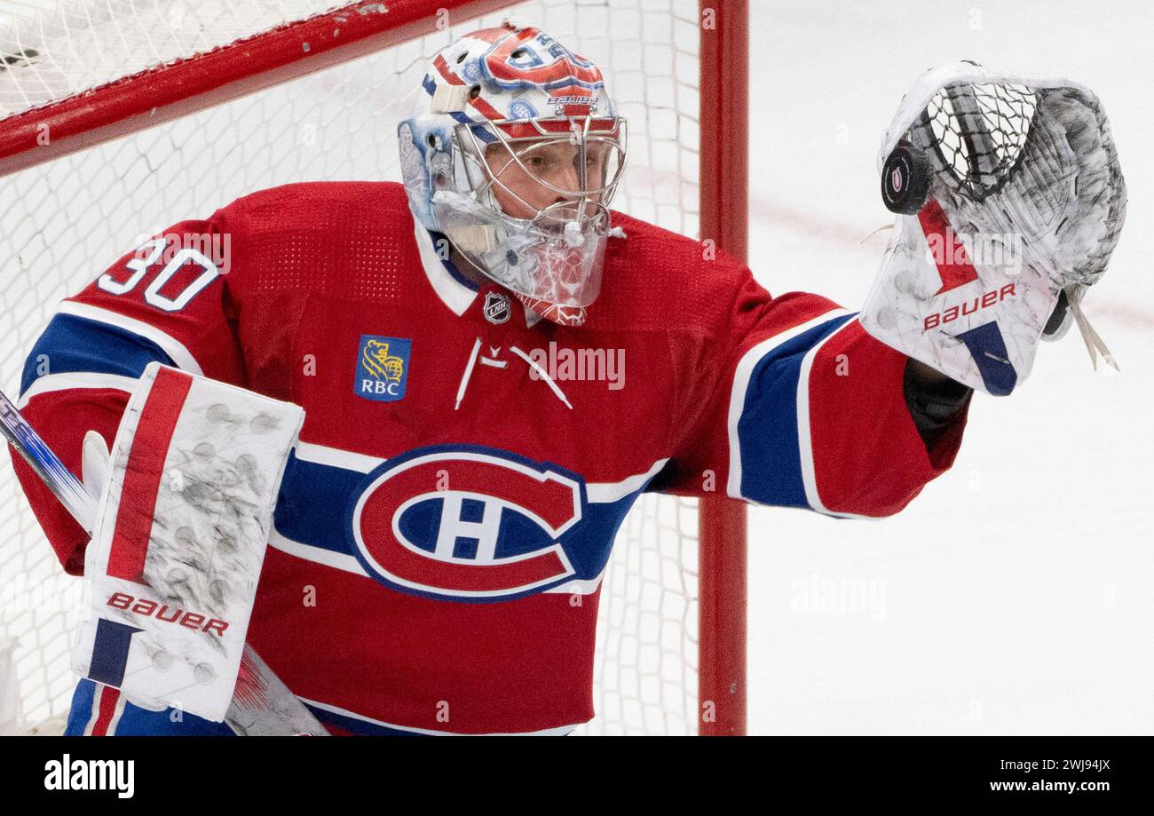Montreal Canadiens goaltender Cayden Primeau makes a glove save against ...