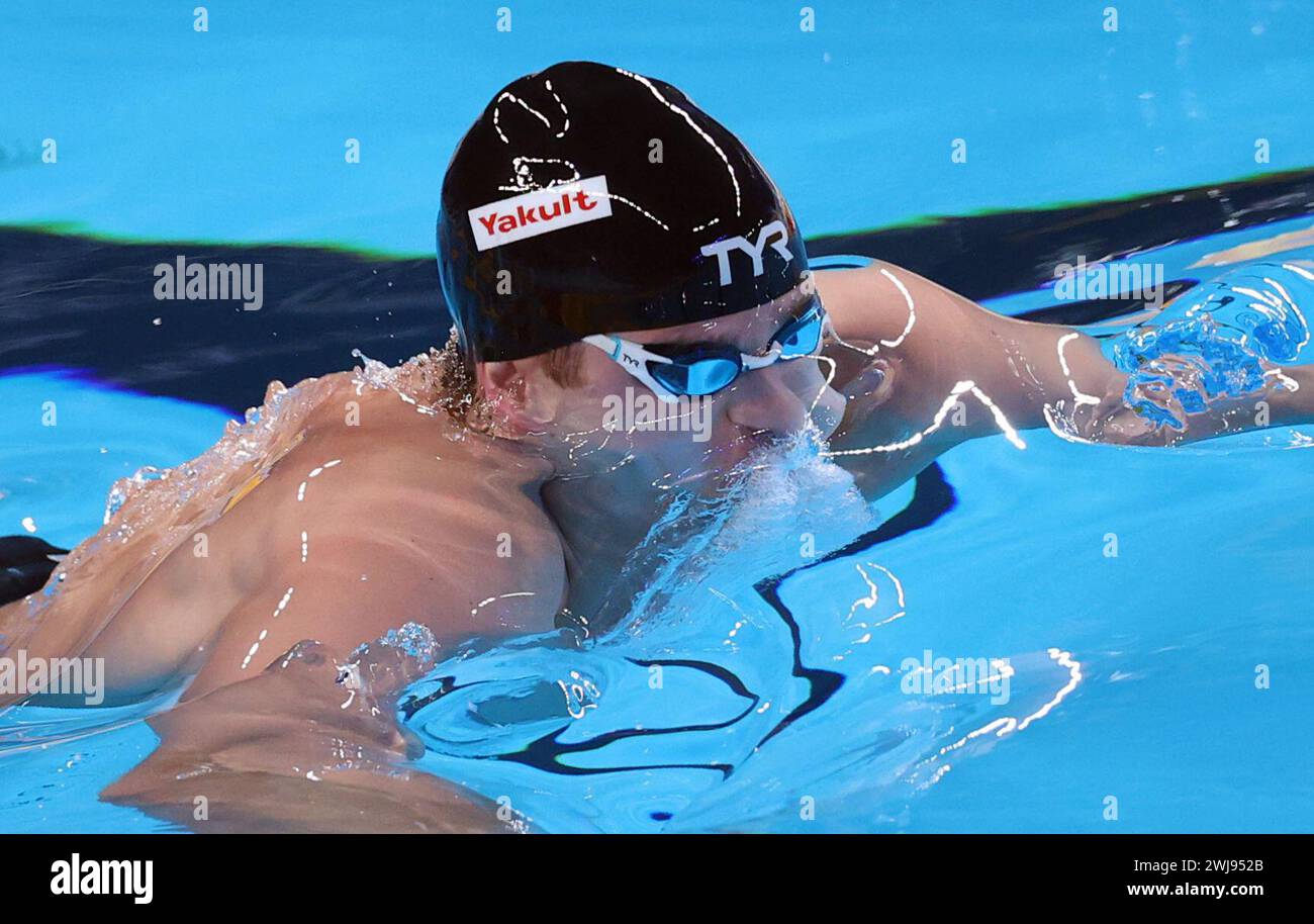 Doha, Qatar. 13th Feb, 2024. Nic Fink of the United States competes ...