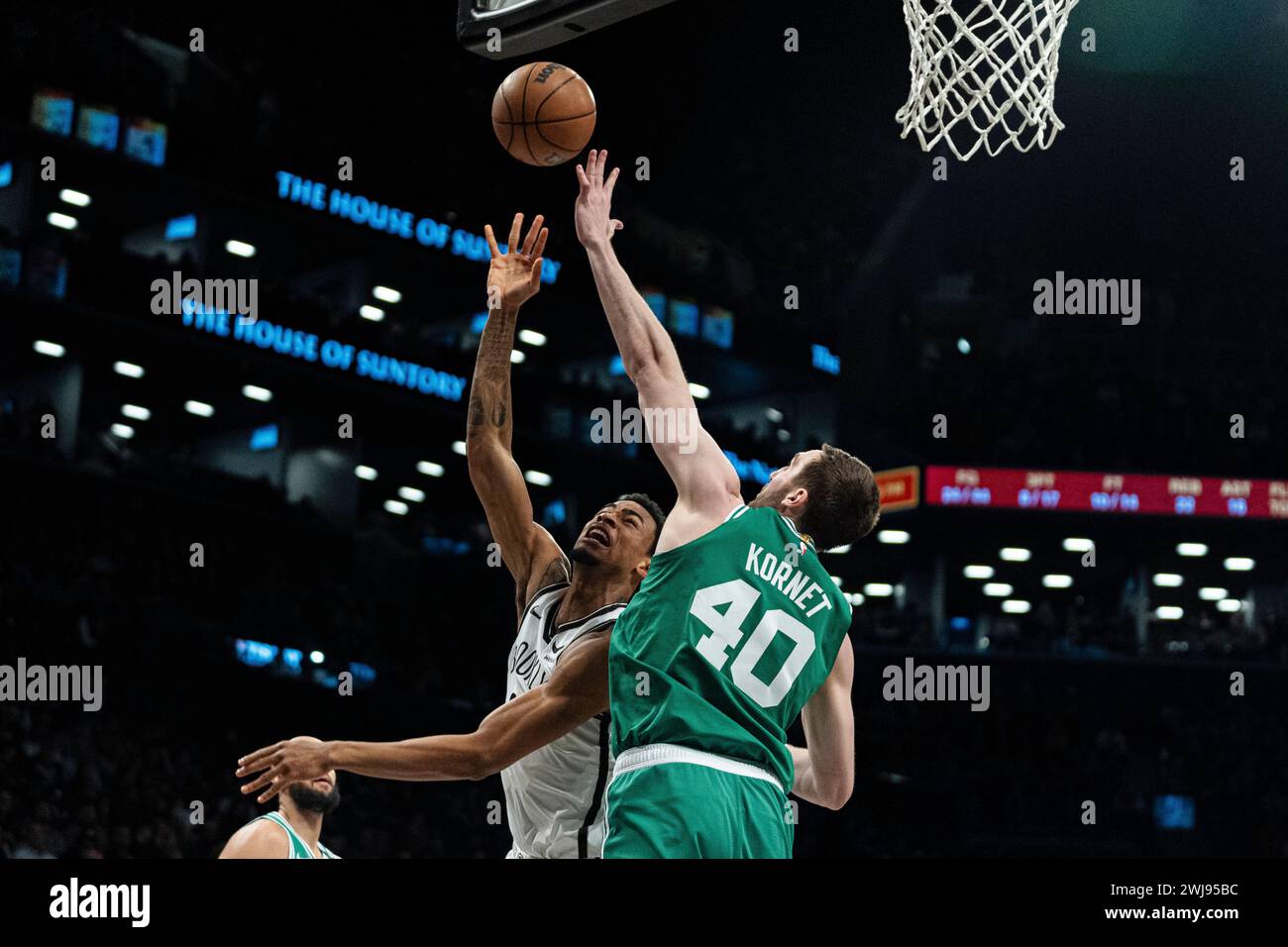 Brooklyn Nets center Nic Claxton shoots over Boston Celtics center Luke ...