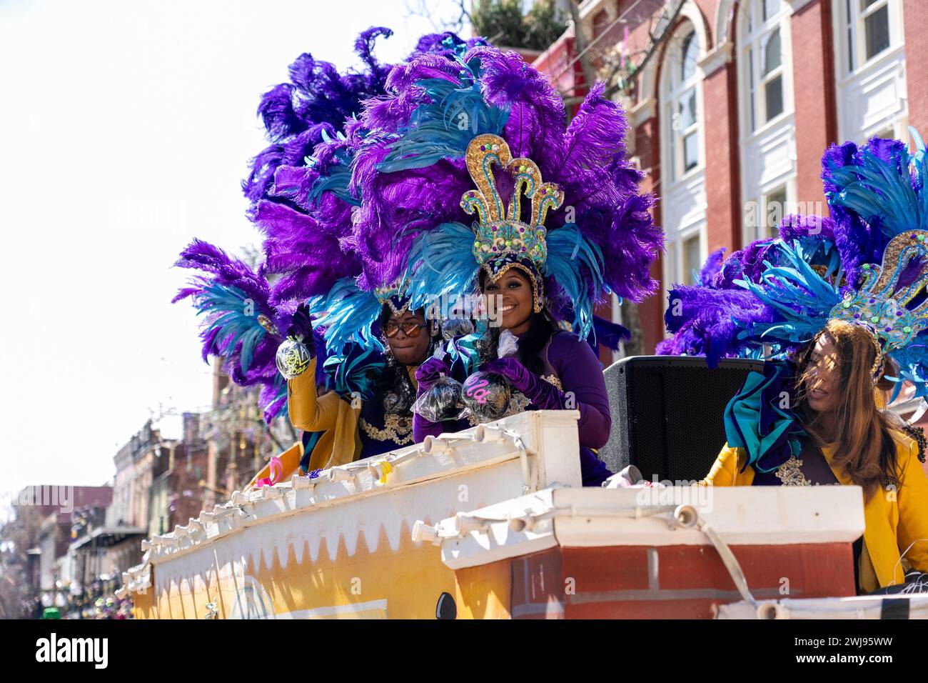 Paradegoers are seen during the Krewe of Zulu Mardi Gras Parade in ...