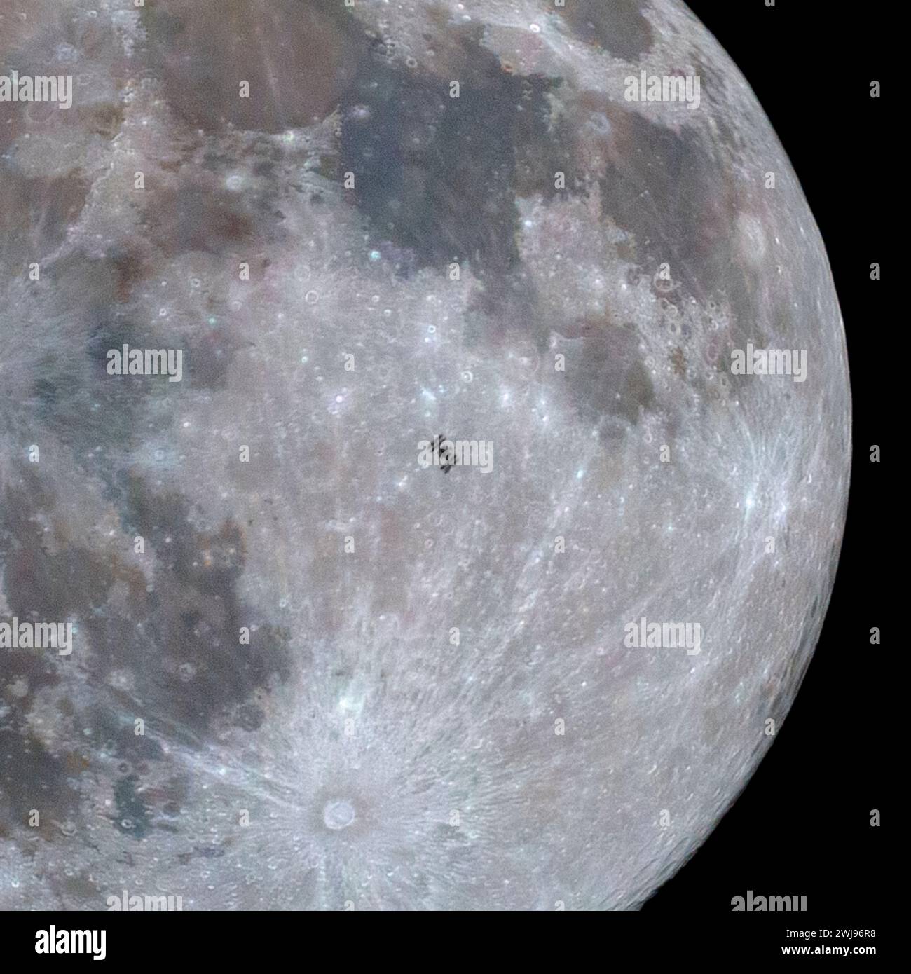 ISS in front of the Moon Stock Photo - Alamy