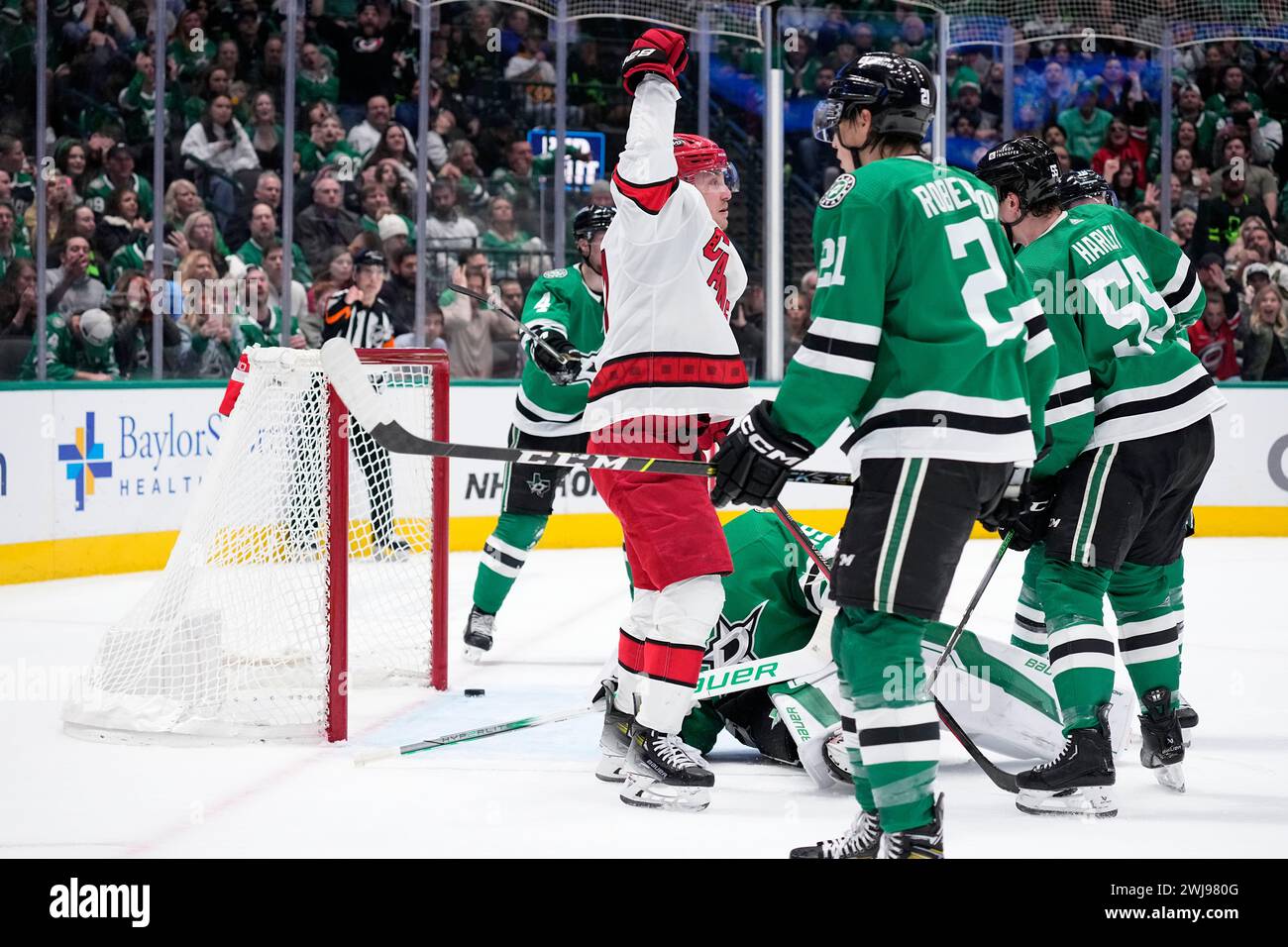 Carolina Hurricanes right wing Jesper Fast, center, celebrates his goal ...