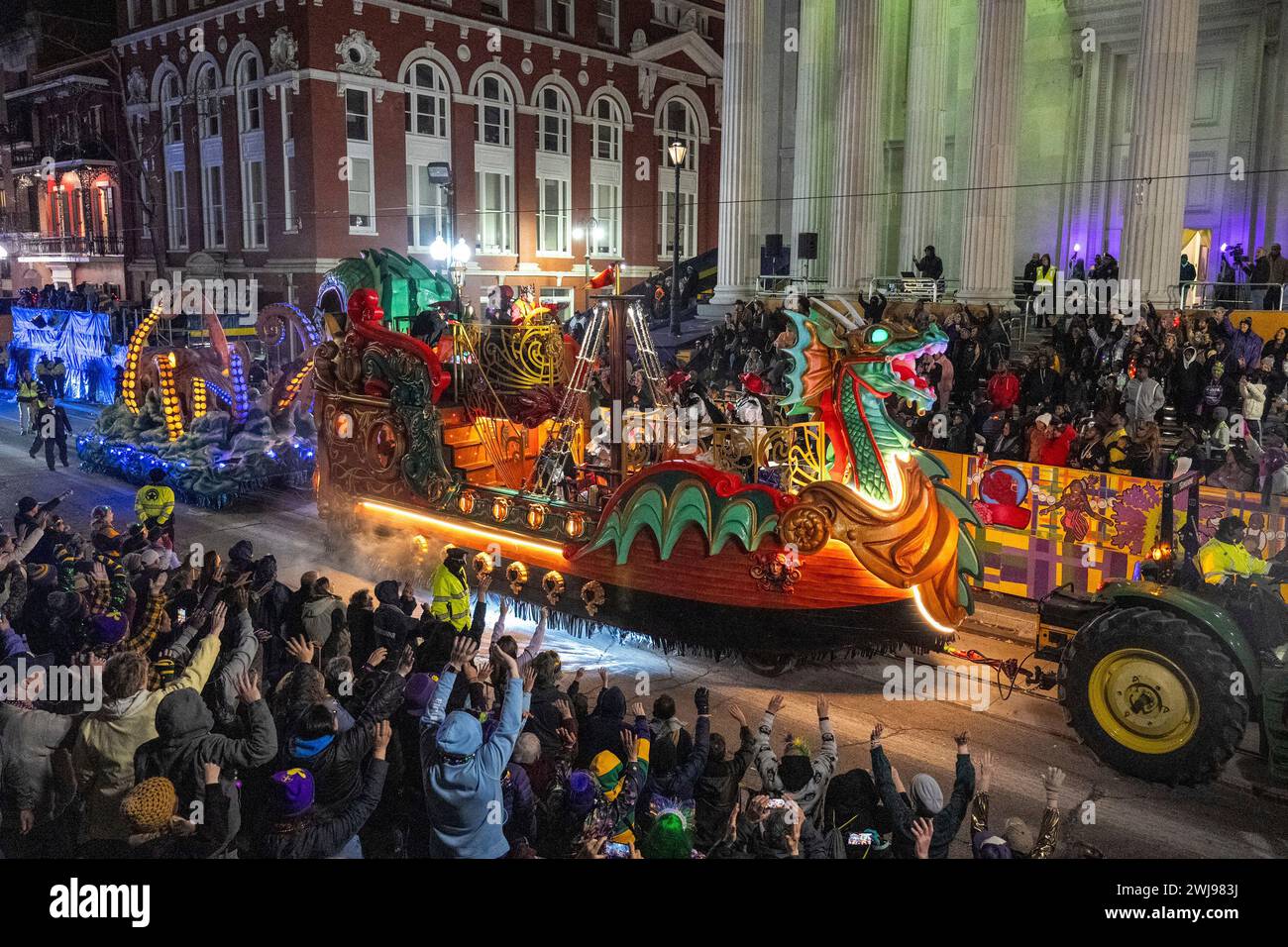 Paradegoers are seen during the Krewe of Orpheus Mardi Gras Parade in ...
