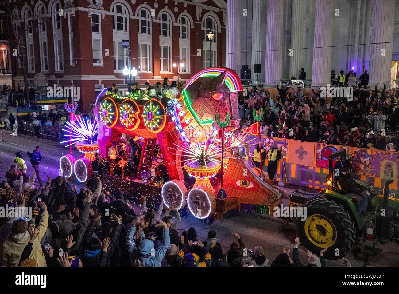 Paradegoers are seen during the Krewe of Orpheus Mardi Gras Parade in ...