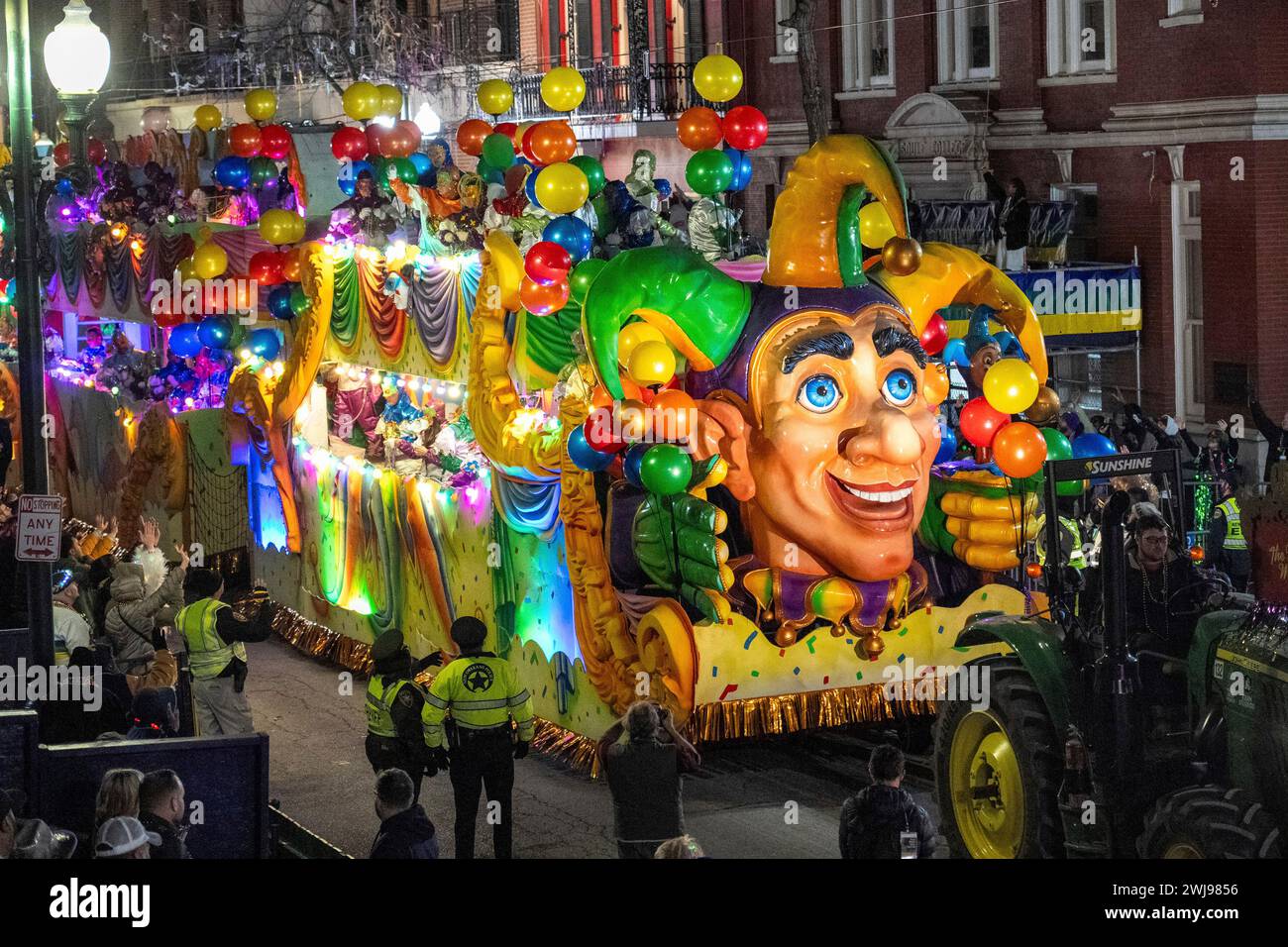 Paradegoers are seen during the Krewe of Orpheus Mardi Gras Parade in ...