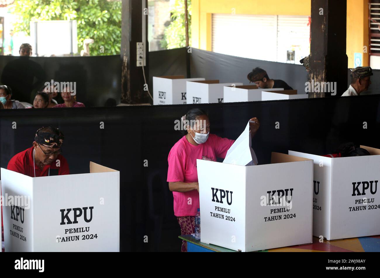 People cast their ballots at a polling station during the presidential ...
