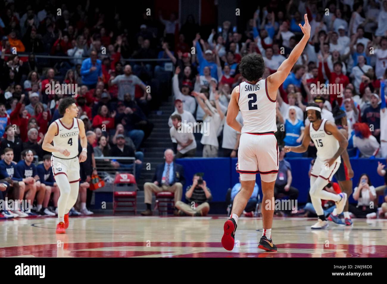 Dayton forward Nate Santos (2) reacts to making a three-point basket ...