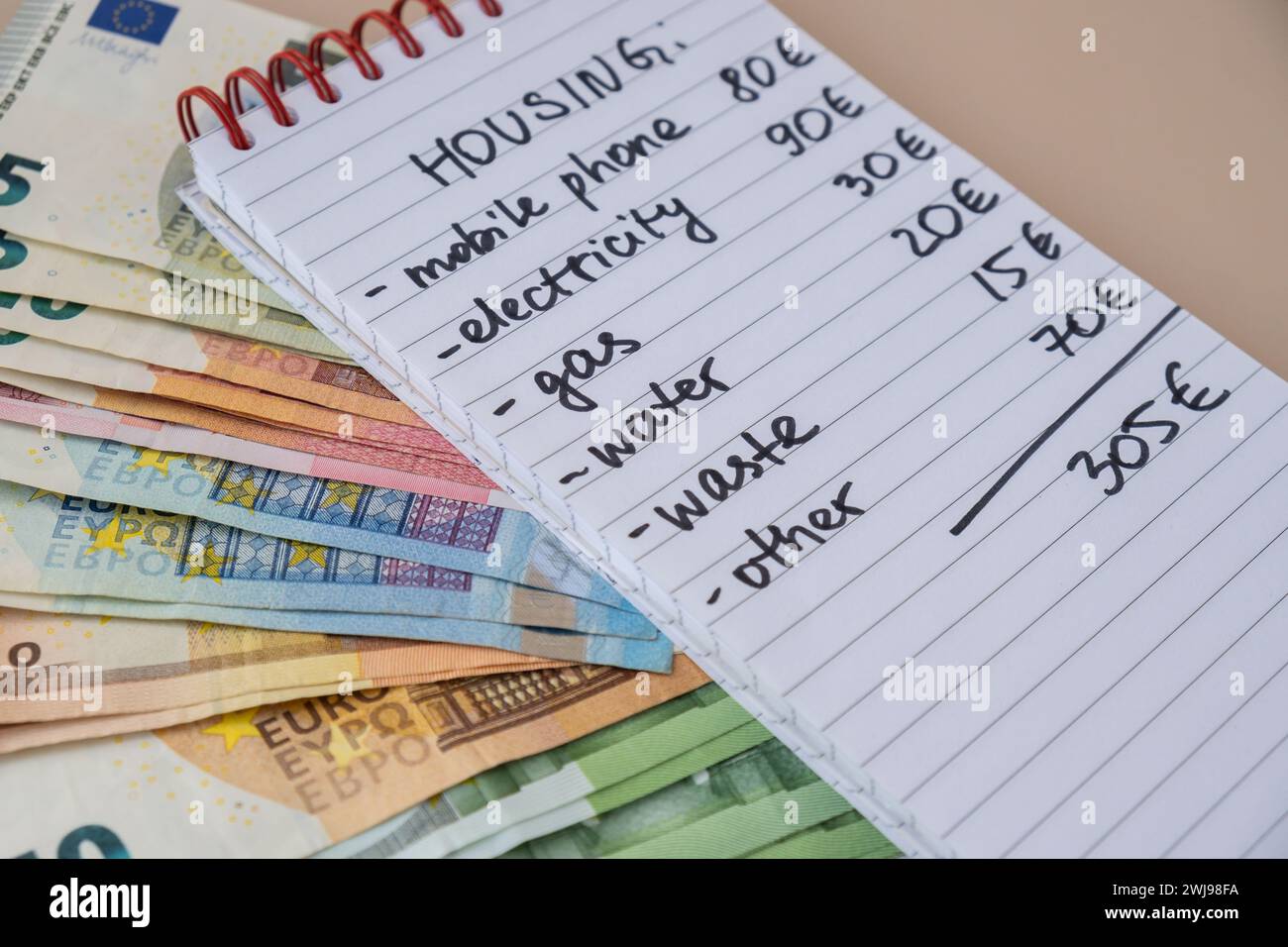 Counting receipt for utilities payment. Euro cash money bill ...