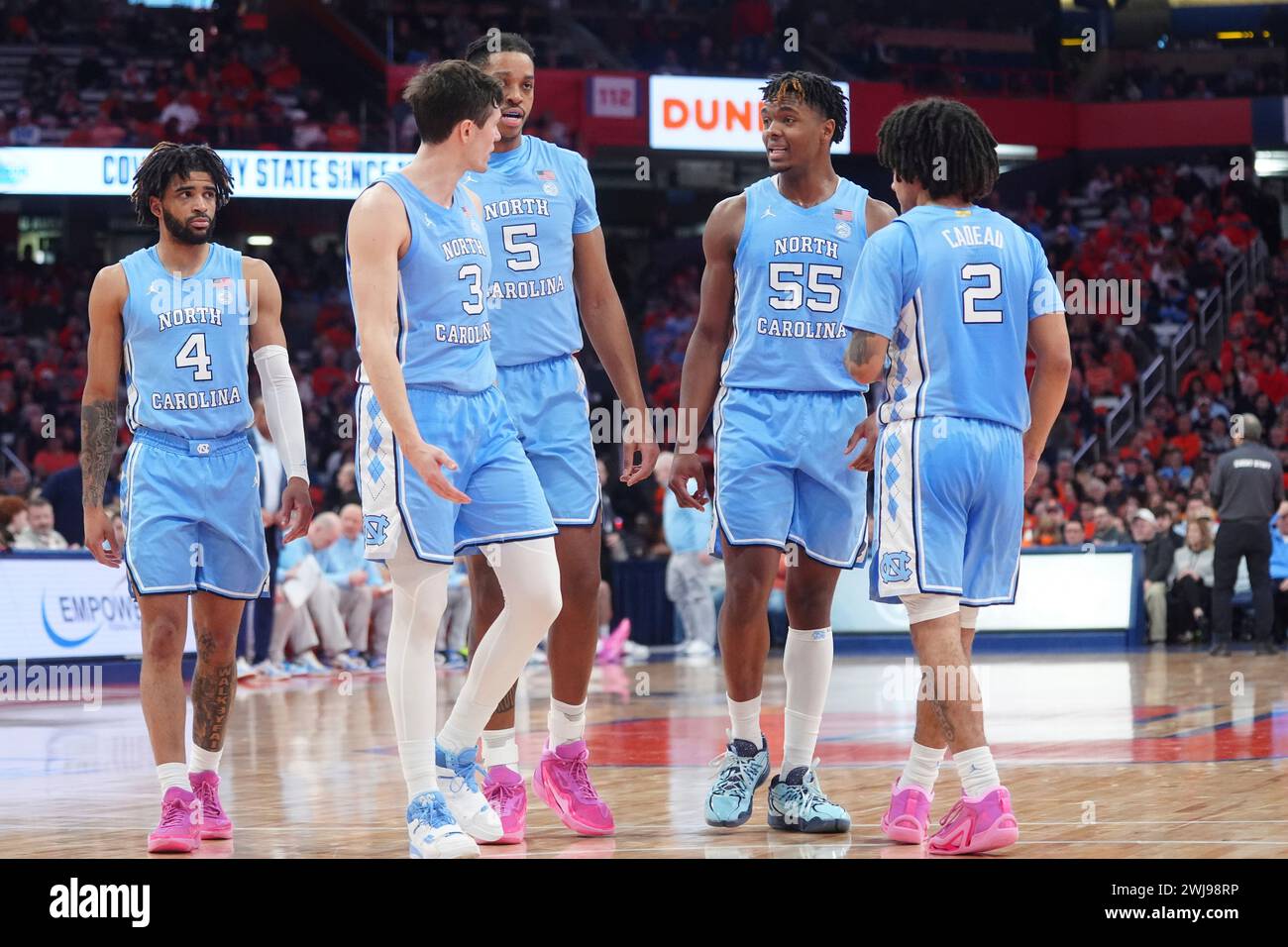 SYRACUSE, NY - FEBRUARY 13: The North Carolina Tar Heels huddle during ...