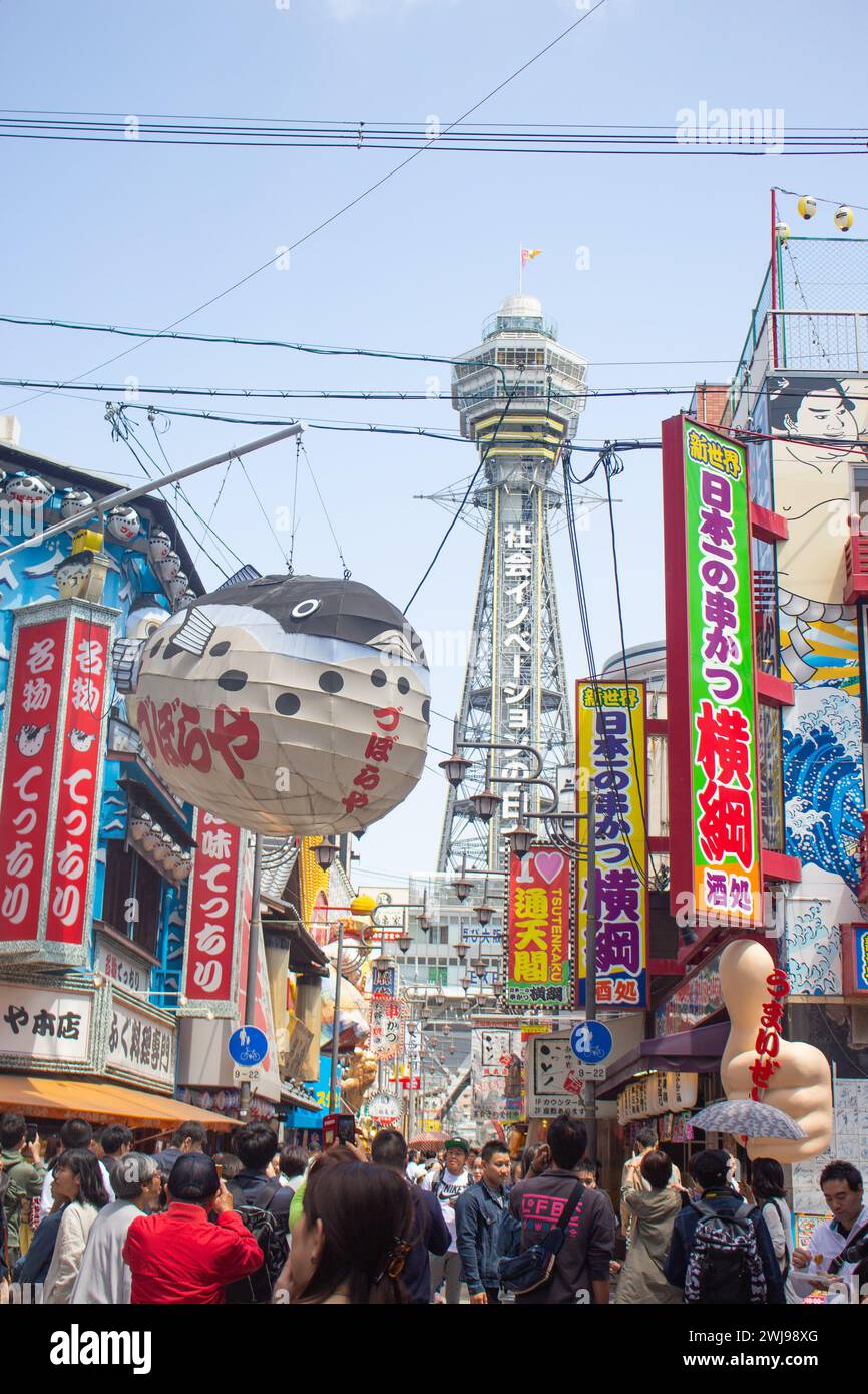 Shinseikai Food Street Signs in front of Tsutenkaku Tower, Osaka, Japan ...