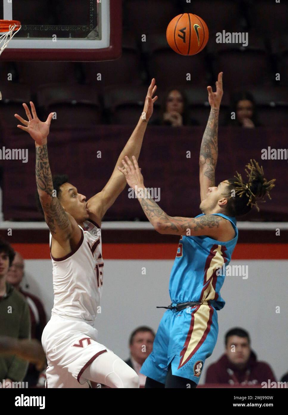 Florida State's De'Ante Green (5) shoots while defended by Virginia ...