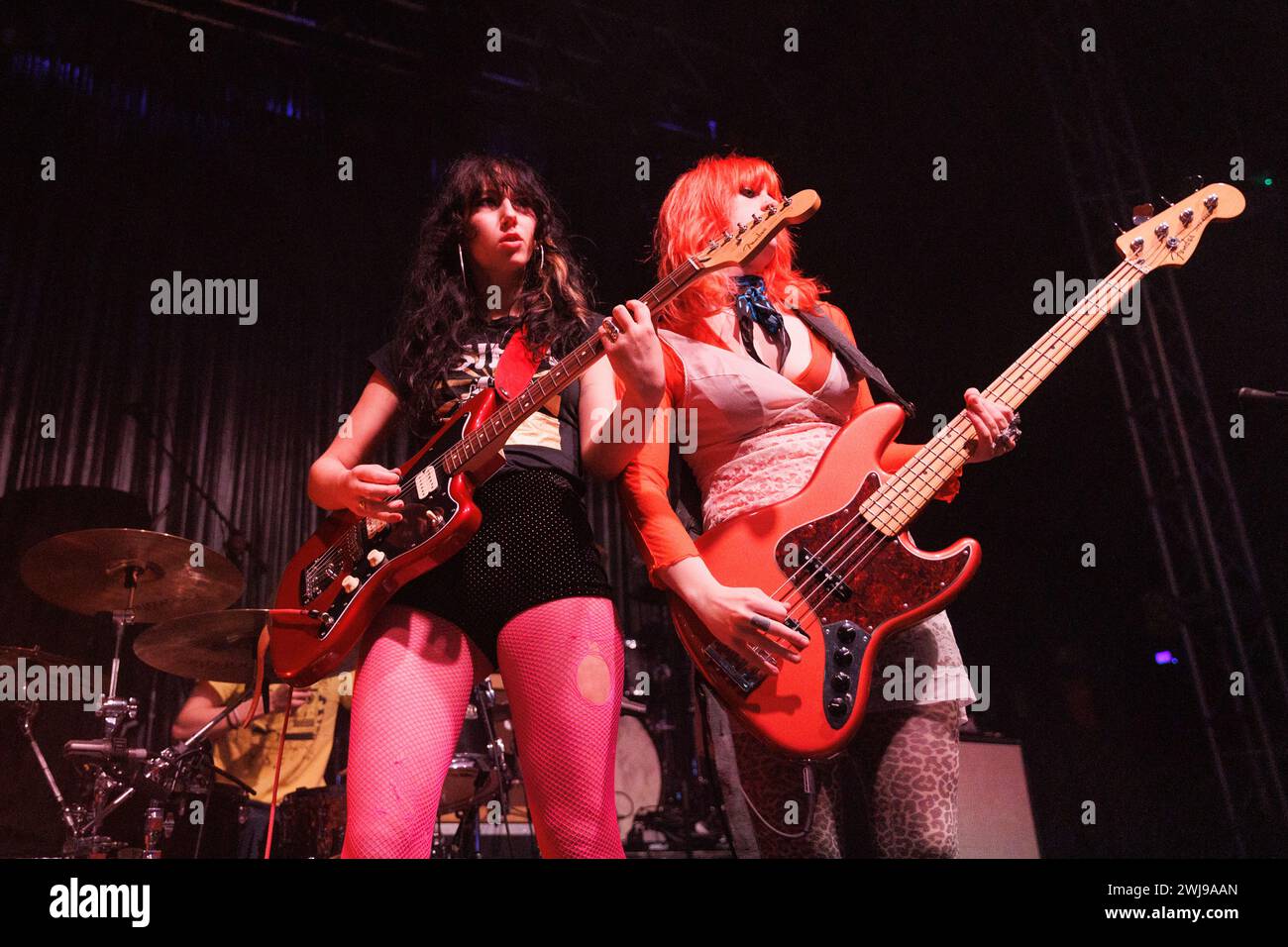 Talulah Sim-Savage and Lola Sam of the rock band HotWax performing live ...