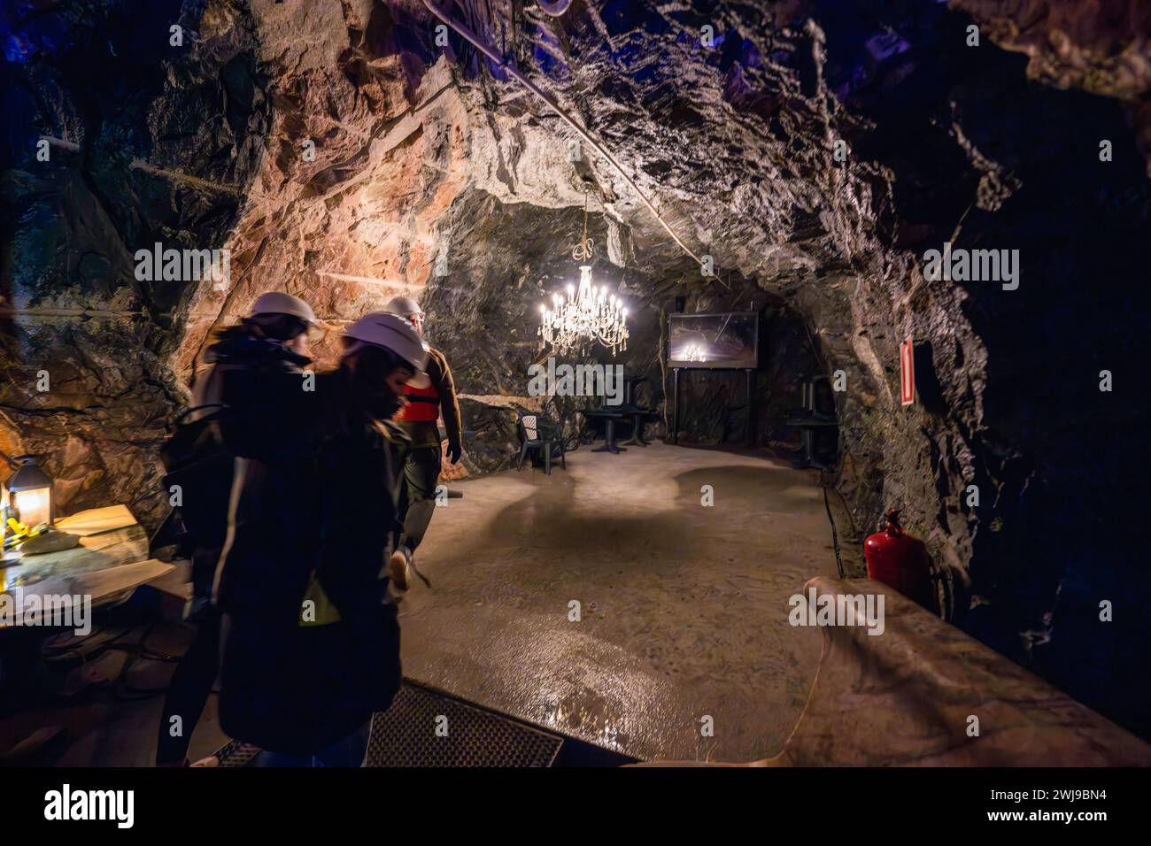 Several visitors tour a room made of marble during a visit to the ...